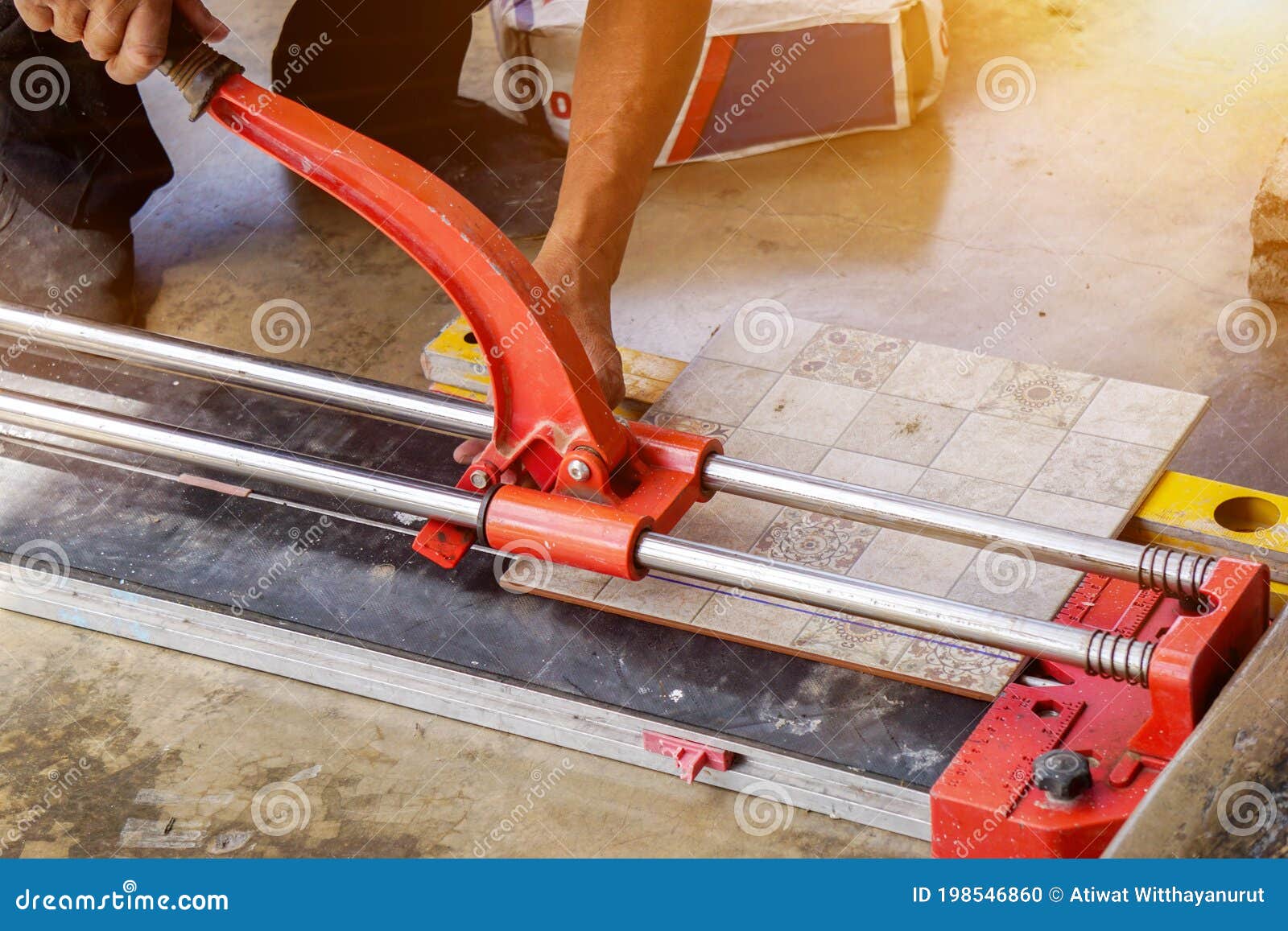 Closeup Hands of Laborer Using Cutting Tile Machine at Construction ...