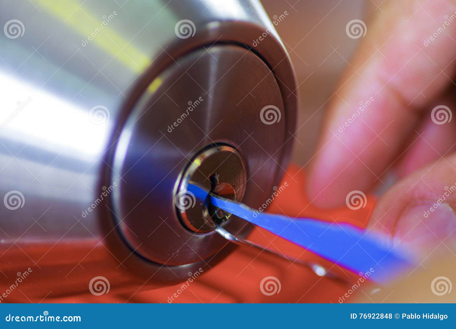 Closeup Hands of Locksmith Using Metal Pick Tools To Open Locked Door ...