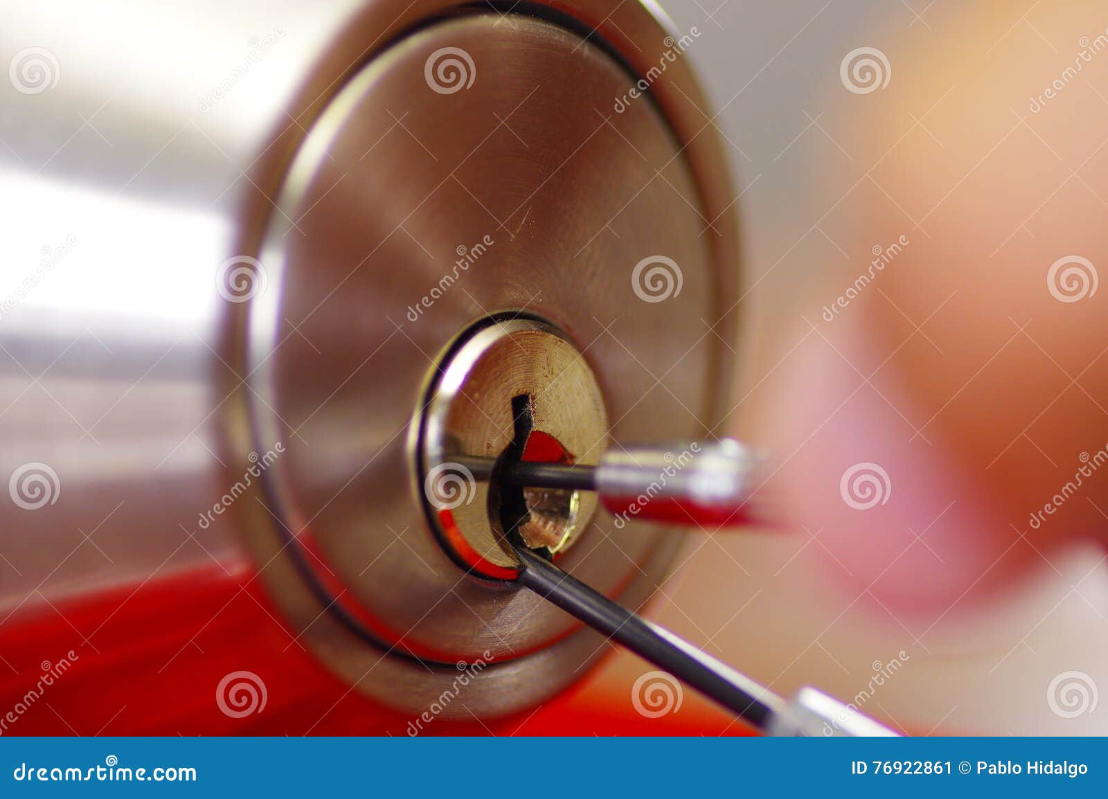 Closeup Hands of Locksmith Using Metal Pick Tools To Open Locked Door ...