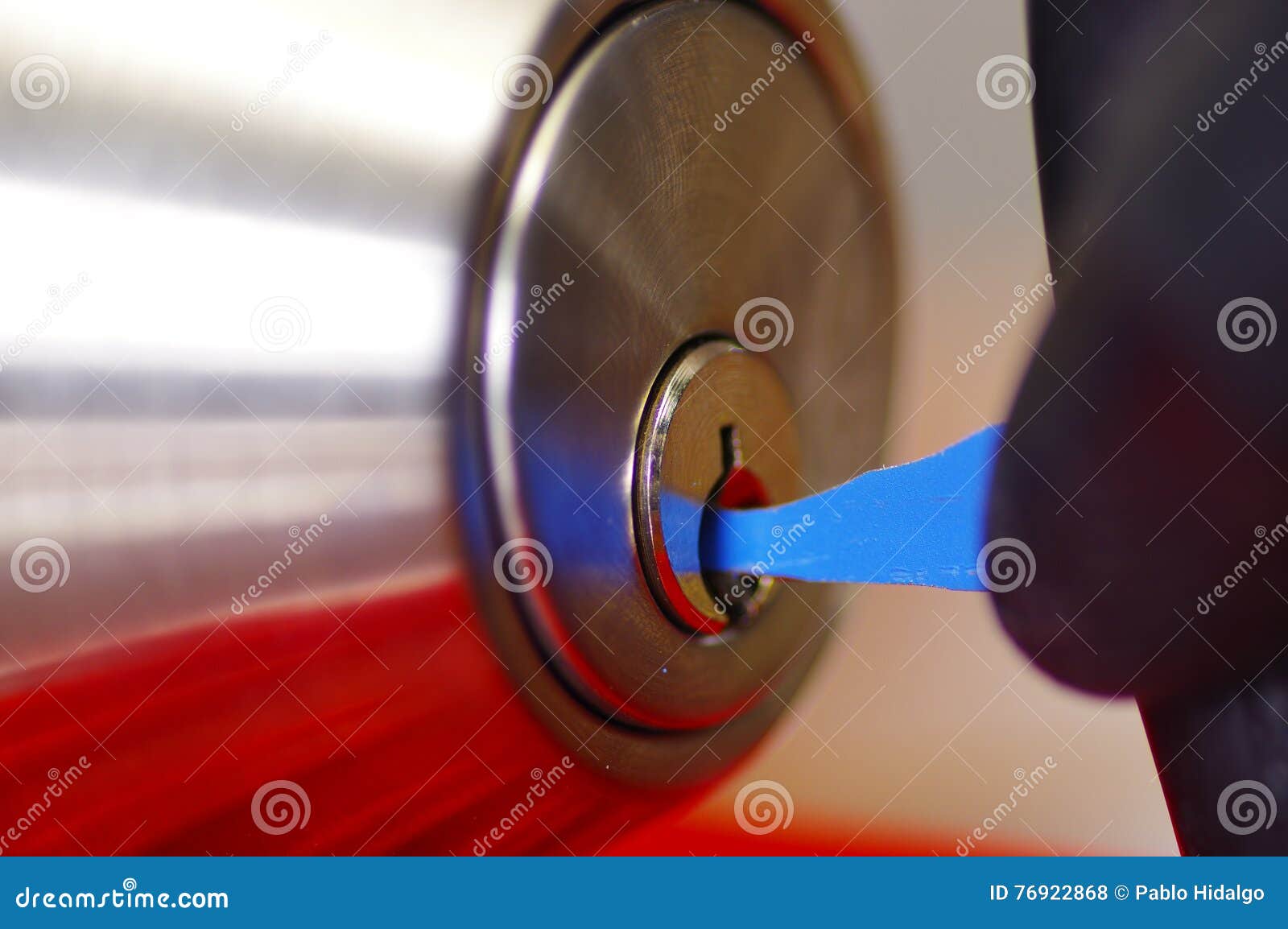 Closeup Hands of Locksmith Using Metal Pick Tools To Open Locked Door ...