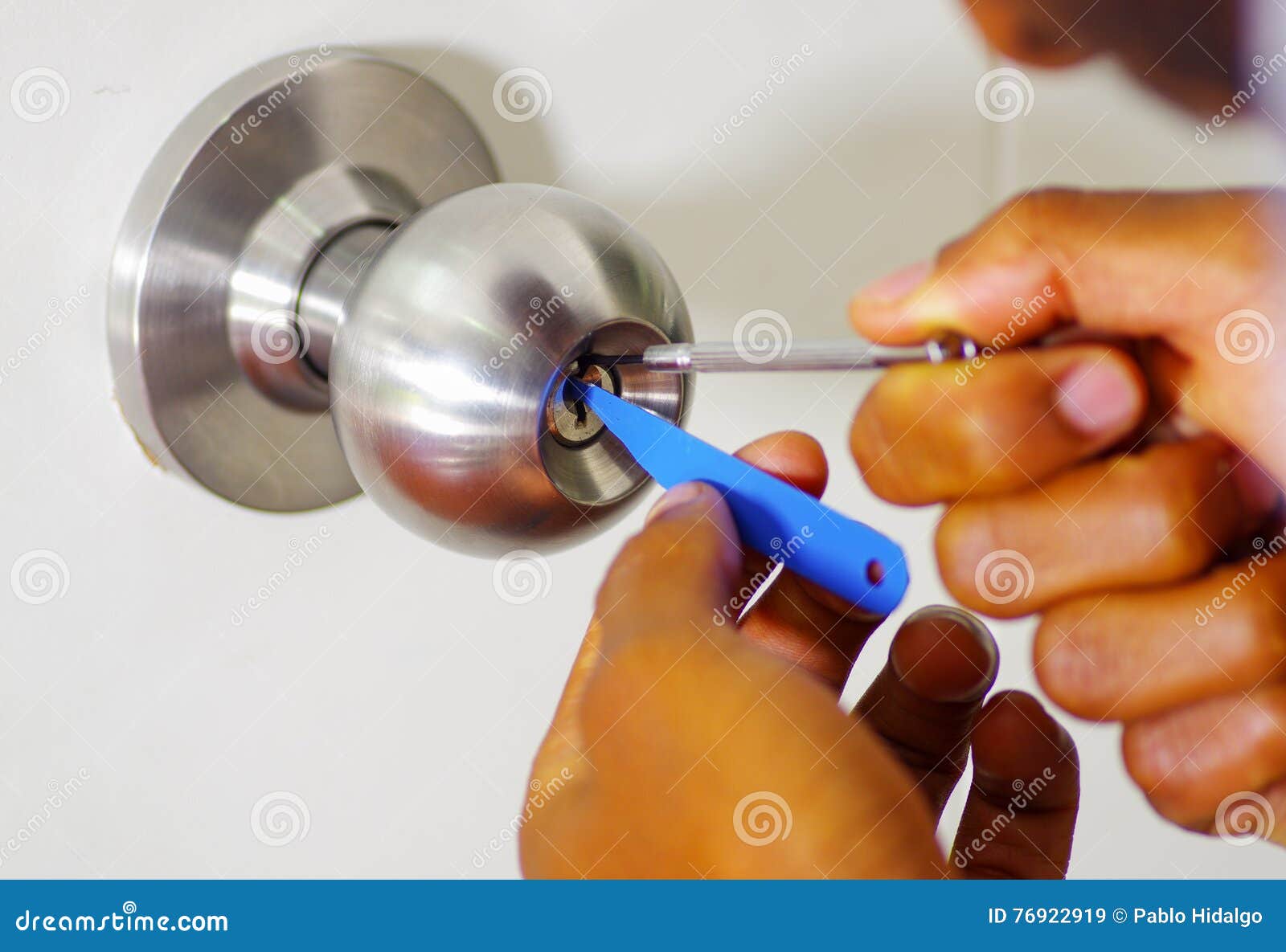 Closeup Hands of Locksmith Using Pick Tools To Open Locked Door Stock ...