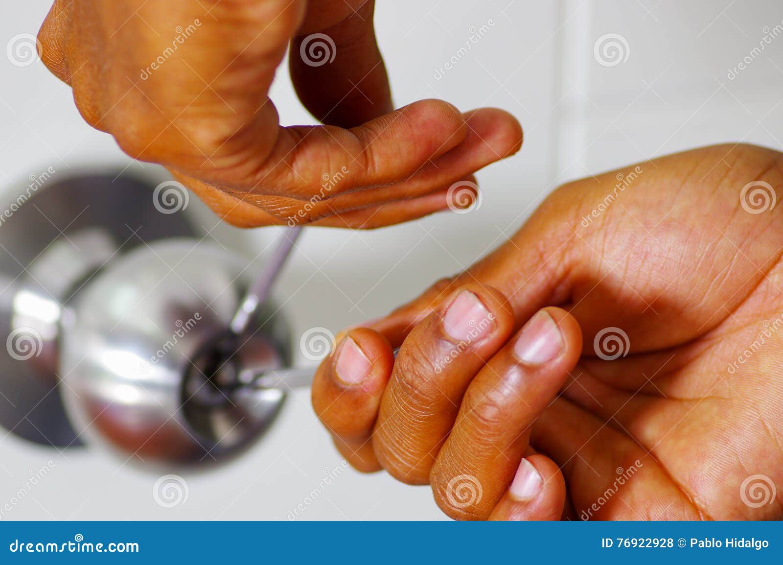 Closeup Hands of Locksmith Using Pick Tools To Open Locked Door Stock ...