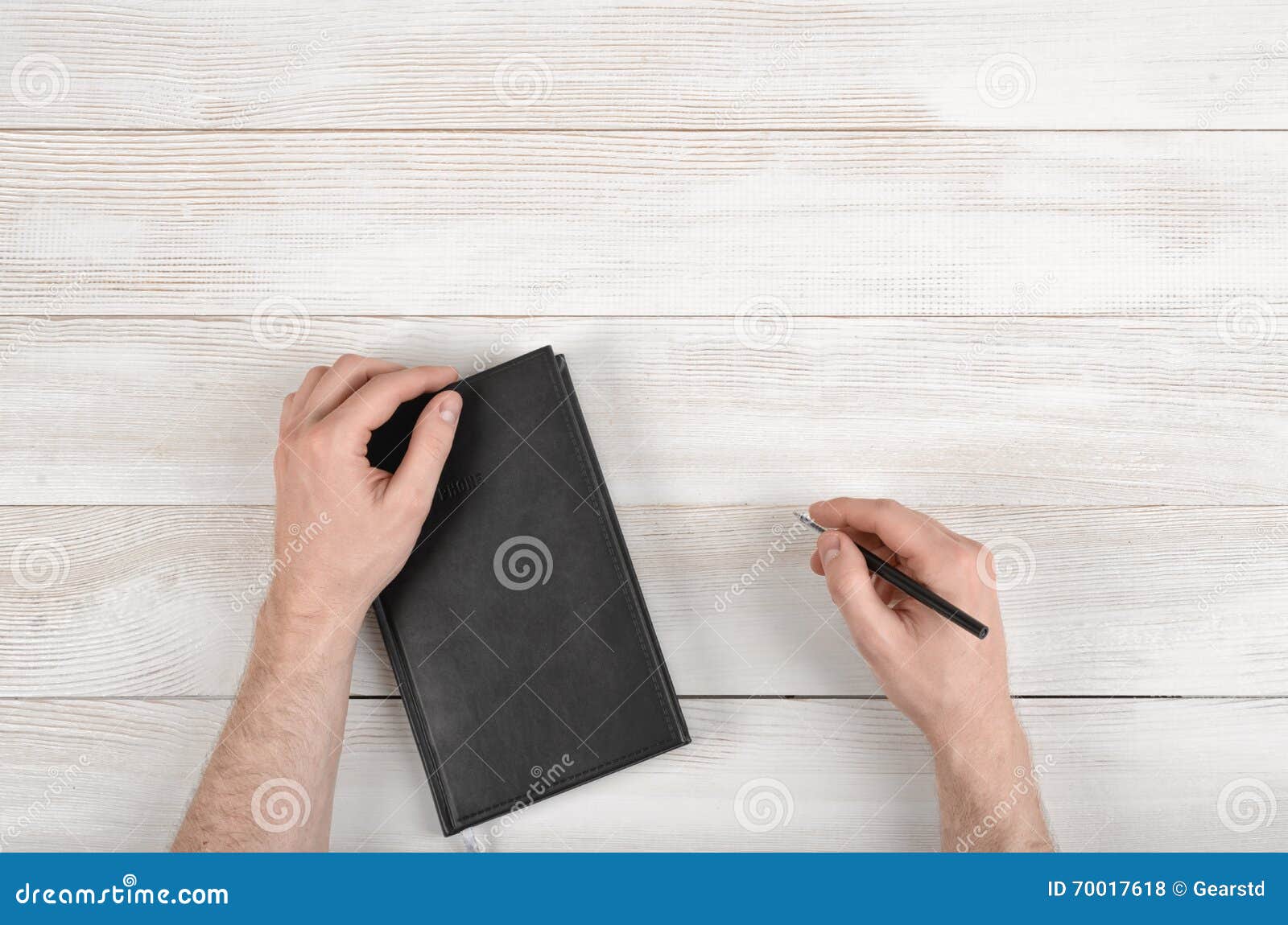 Closeup Hands of Man Holding Pen and Notebook Stock Photo - Image of ...
