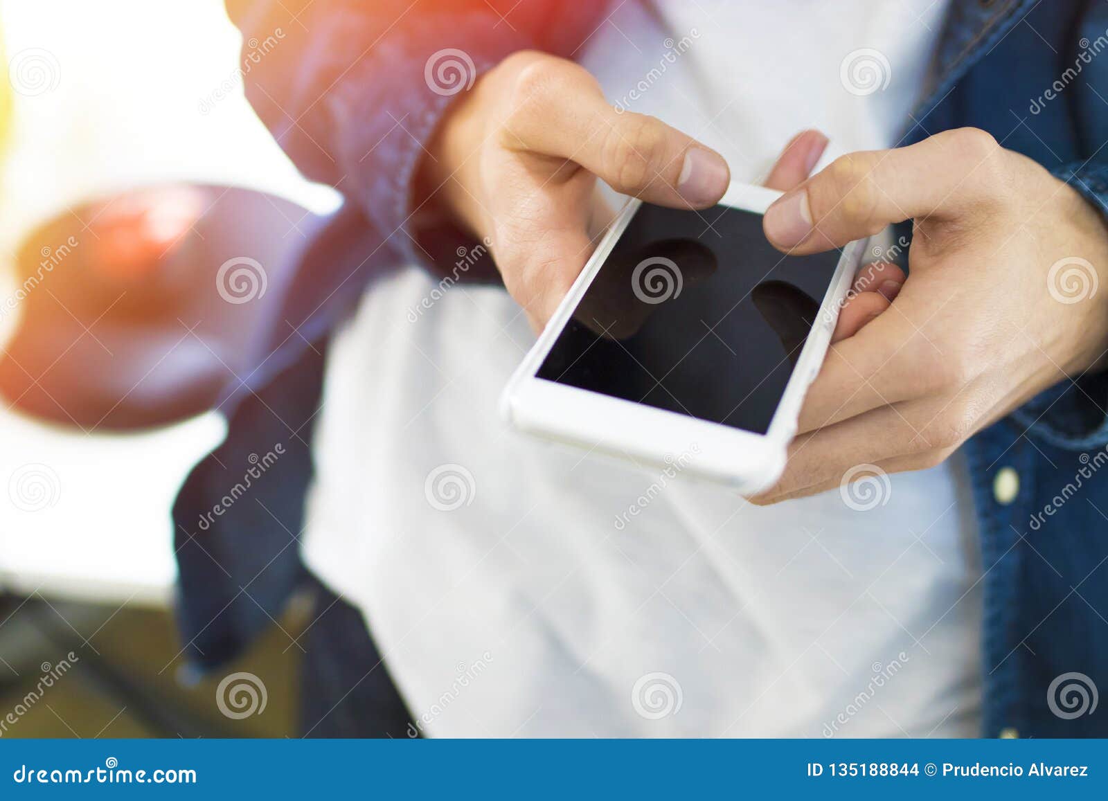 Hands with mobile phone stock photo. Image of female - 135188844