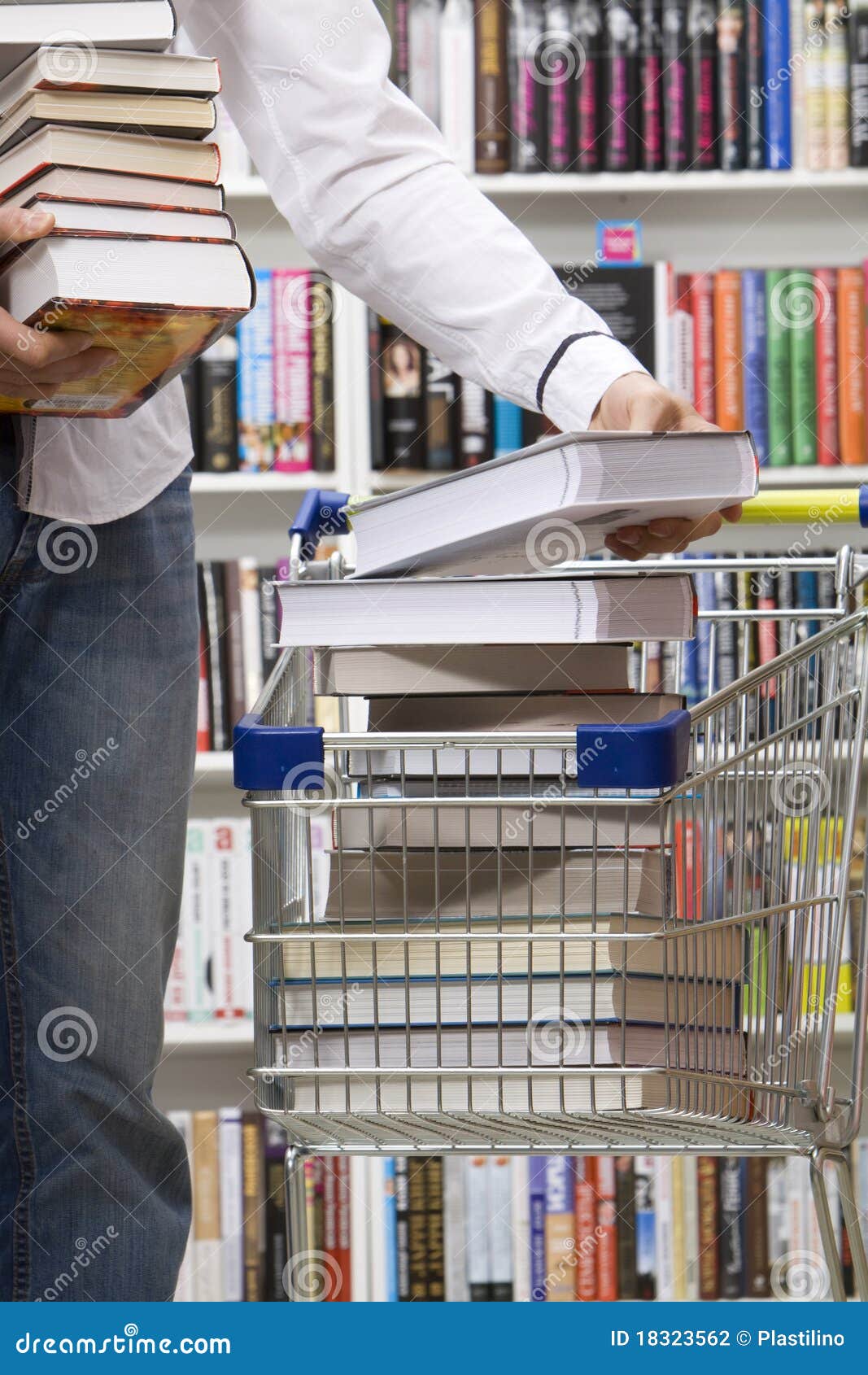 Closeup of Hands Putting Books in a Basket Stock Photo - Image of hand ...