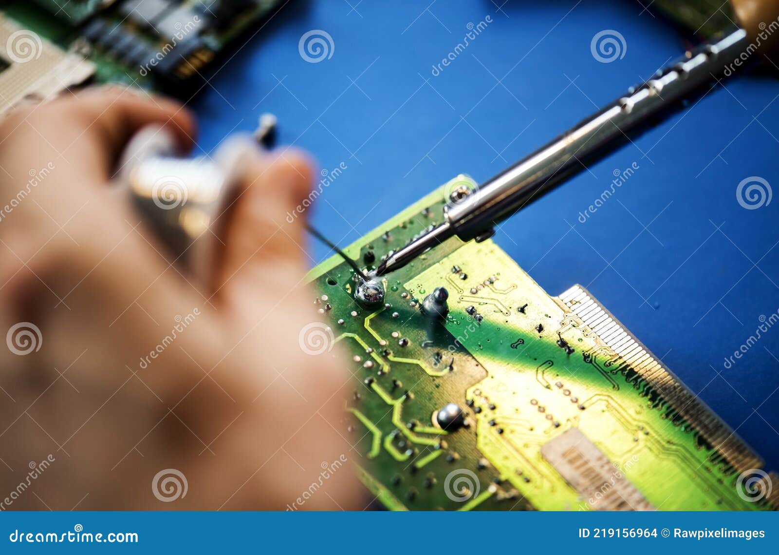 Closeup of Hands Soldering Tin To Electronics Circuit Board Stock Photo ...