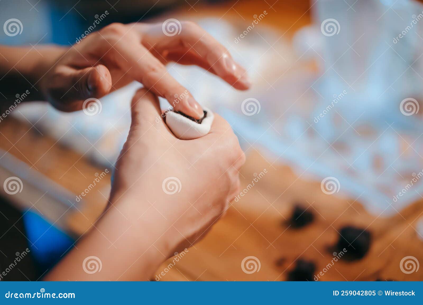 Closeup of Hands Stuffing a Candy Stock Image - Image of chocolate ...