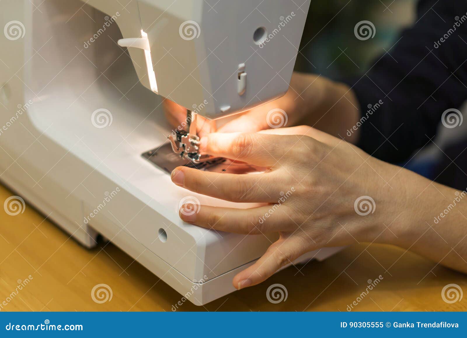 Closeup of Hands a Young Woman Spends Thread a Sewing Machine at Stock ...