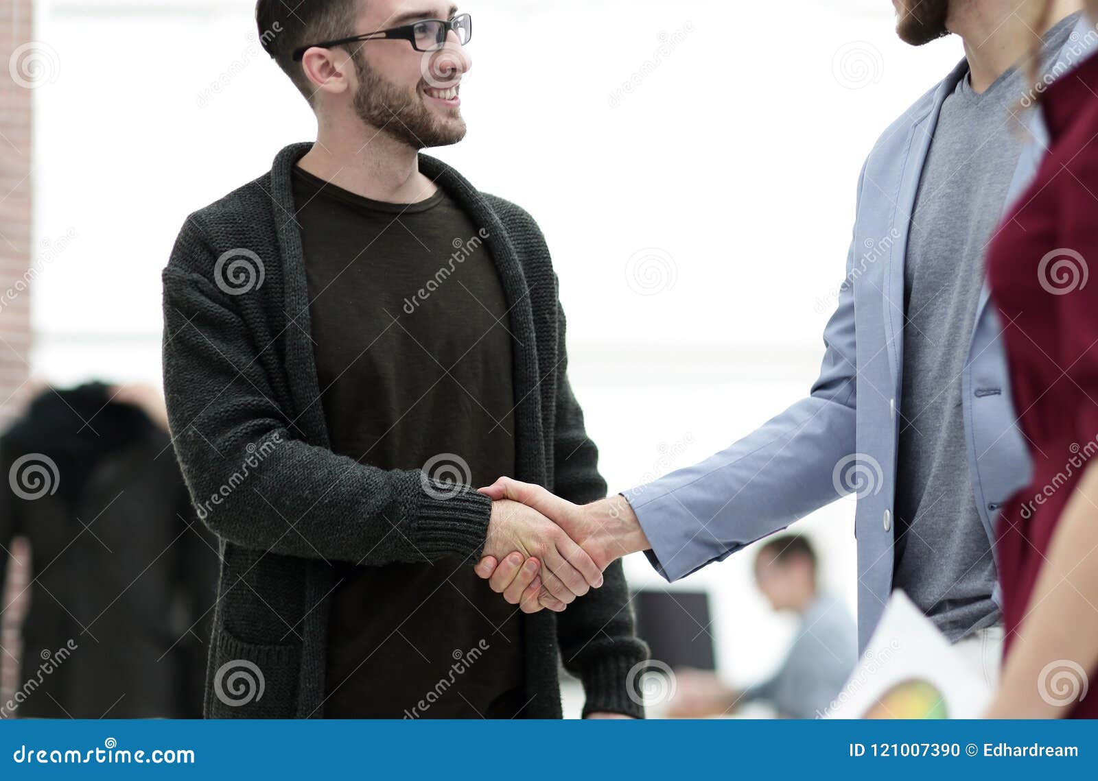 Closeup.the Handshake between the Designer and the Client Stock Photo ...