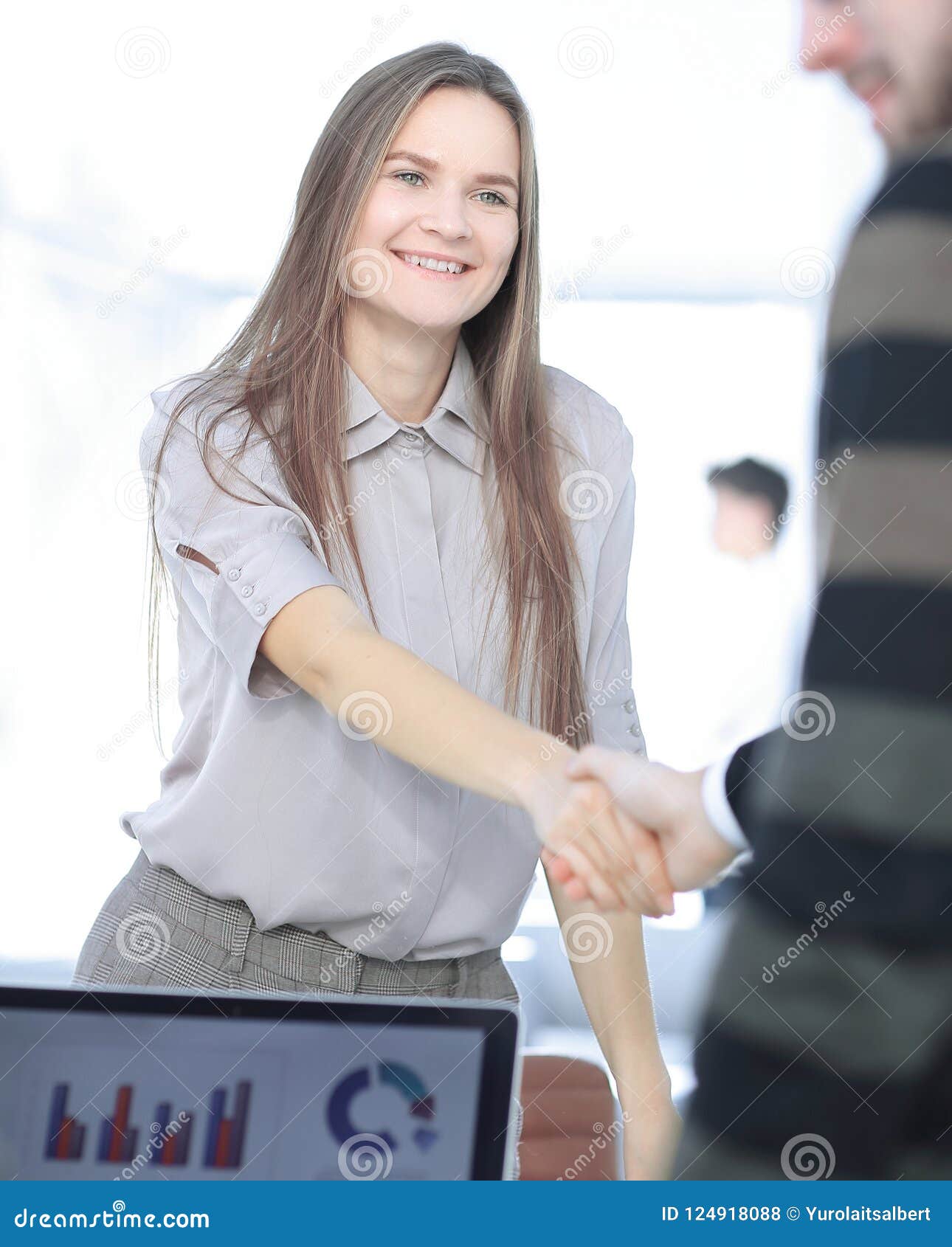 Close Up. the Handshake of Employee and Customer in a Modern Office ...