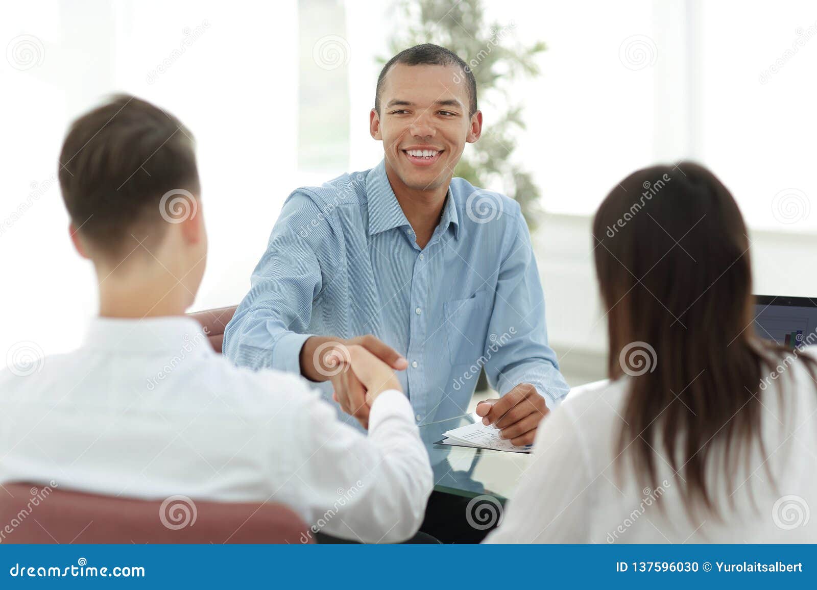 Closeup.handshake Manager and the Client in the Office Stock Photo ...