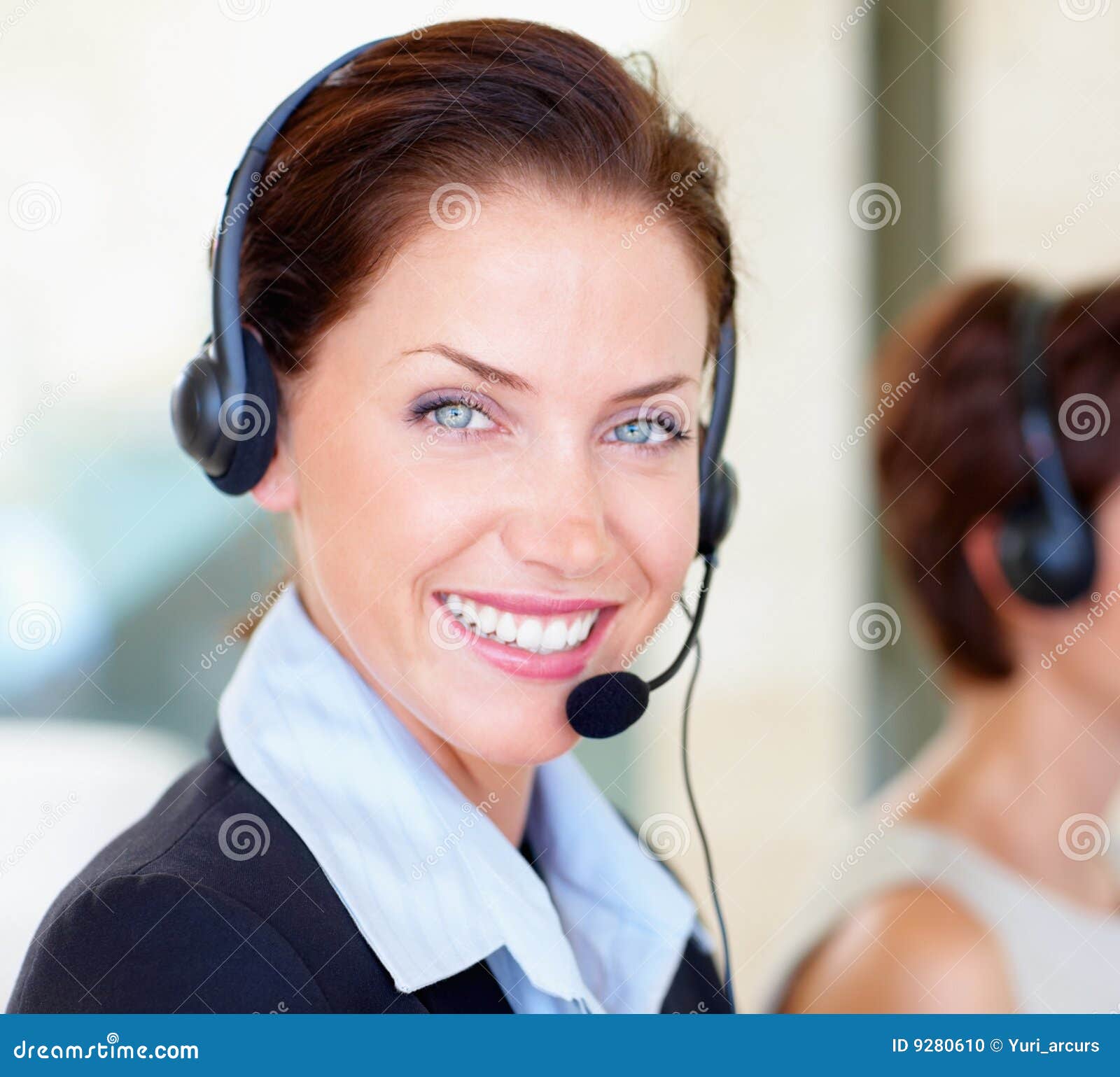 Closeup of a Happy Young Call Centre Employee Stock Photo - Image of ...