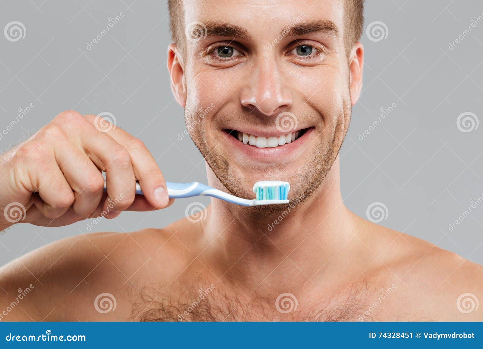 Closeup Happy Young Man Holding Toothbrush with Toothpaste Stock Image ...