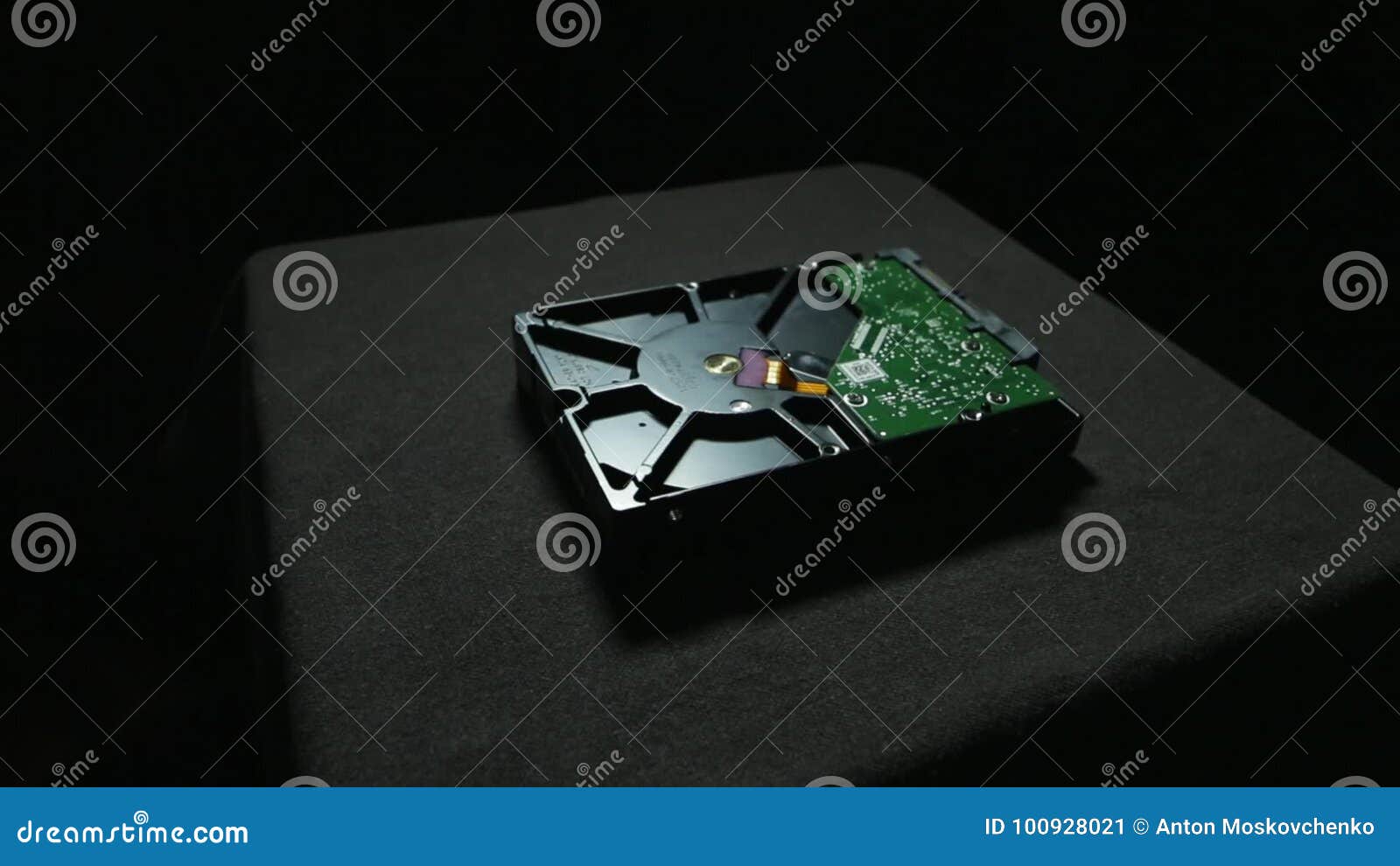 Closeup of HDD Underside in Dark Room on Gray Textile Surface. Hard ...