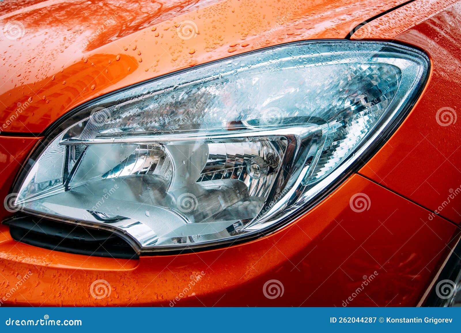 Closeup of Headlamp on Red Car. Front Headlight of Modern Auto Stock ...