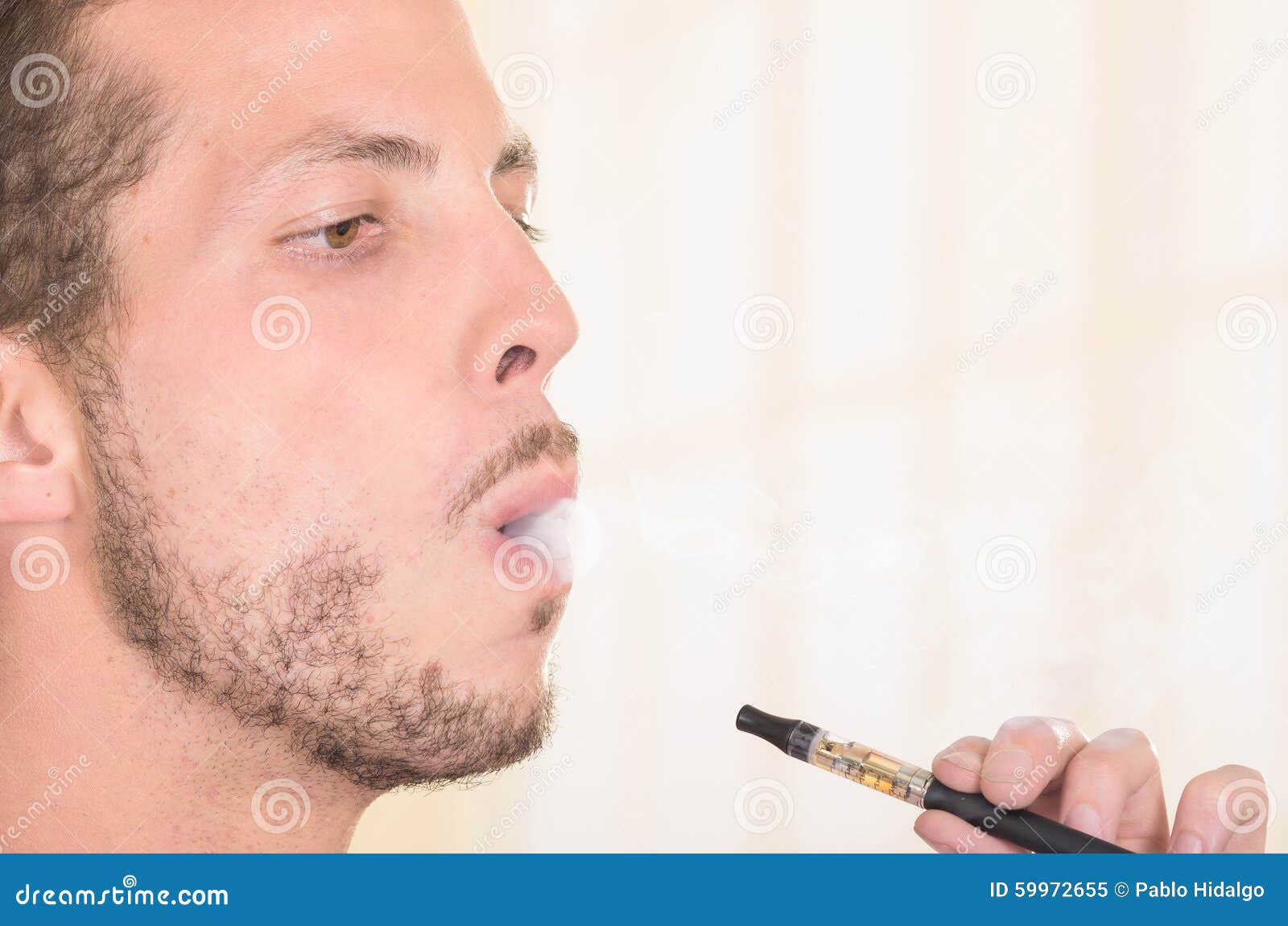 Closeup Headshot of Man Smoking on Electronic Stock Image - Image of ...