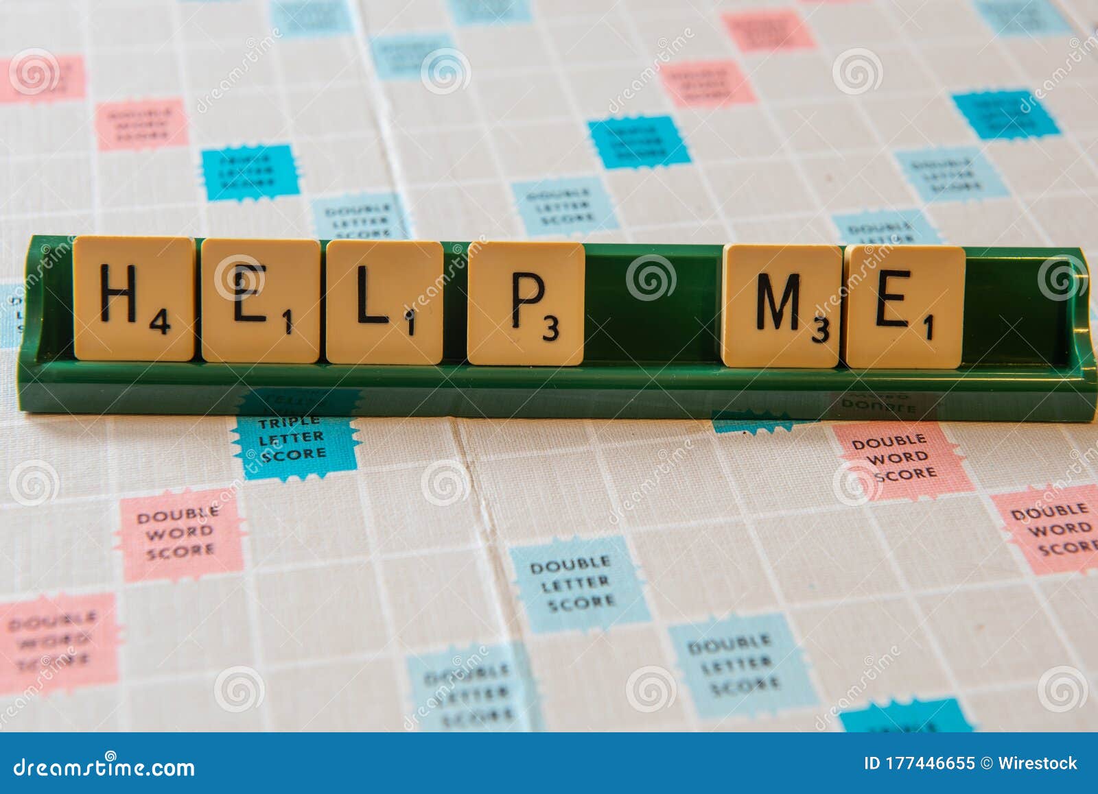 Closeup of Help Me Written on a Scrambling Board Under the Lights Stock ...