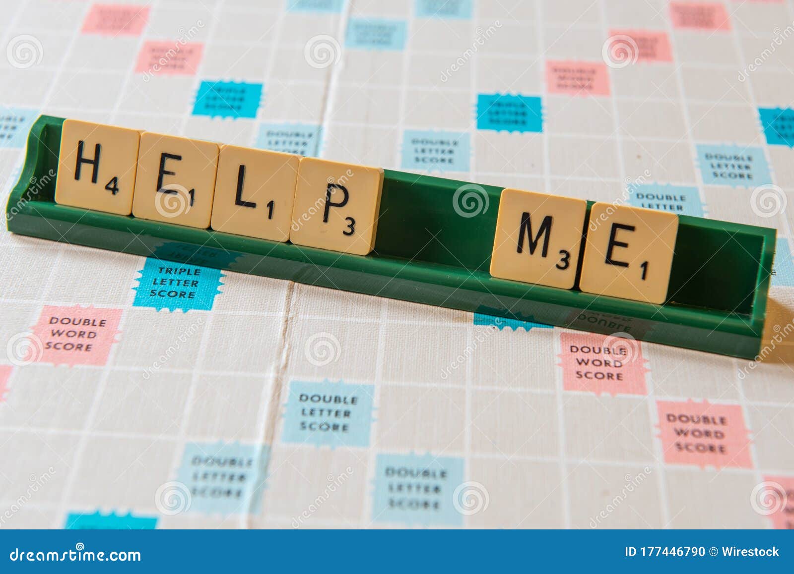 Closeup of Help Me Written on a Scrambling Board Under the Lights Stock ...