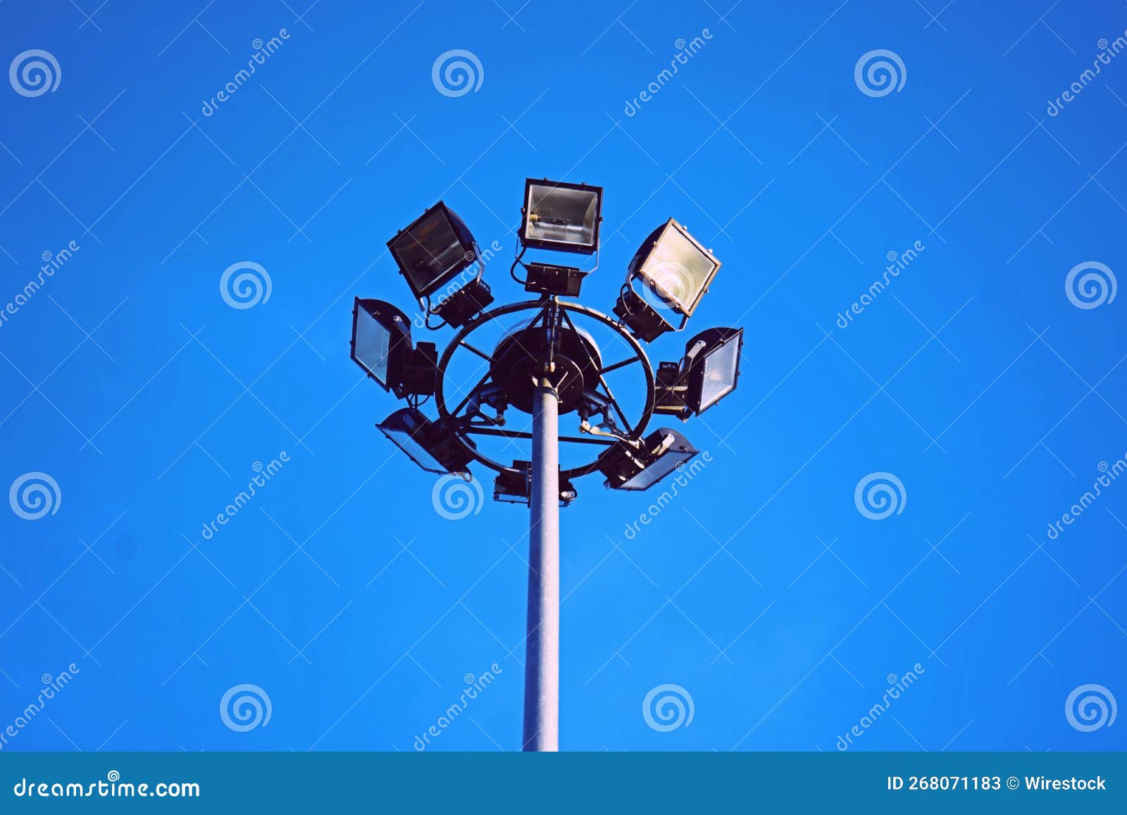 Closeup of a High Voltage Spotlight Tower with Blue Sky Background ...