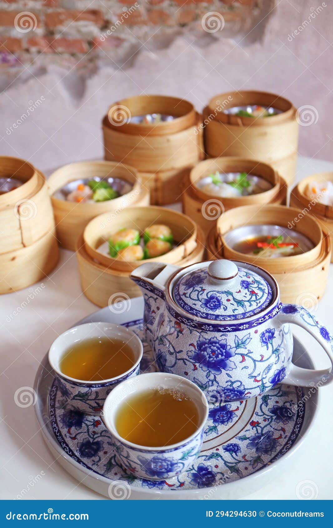 Hot Chinese Oolong Tea Set with Blurry Assorted Dim Sum Dishes Stock ...
