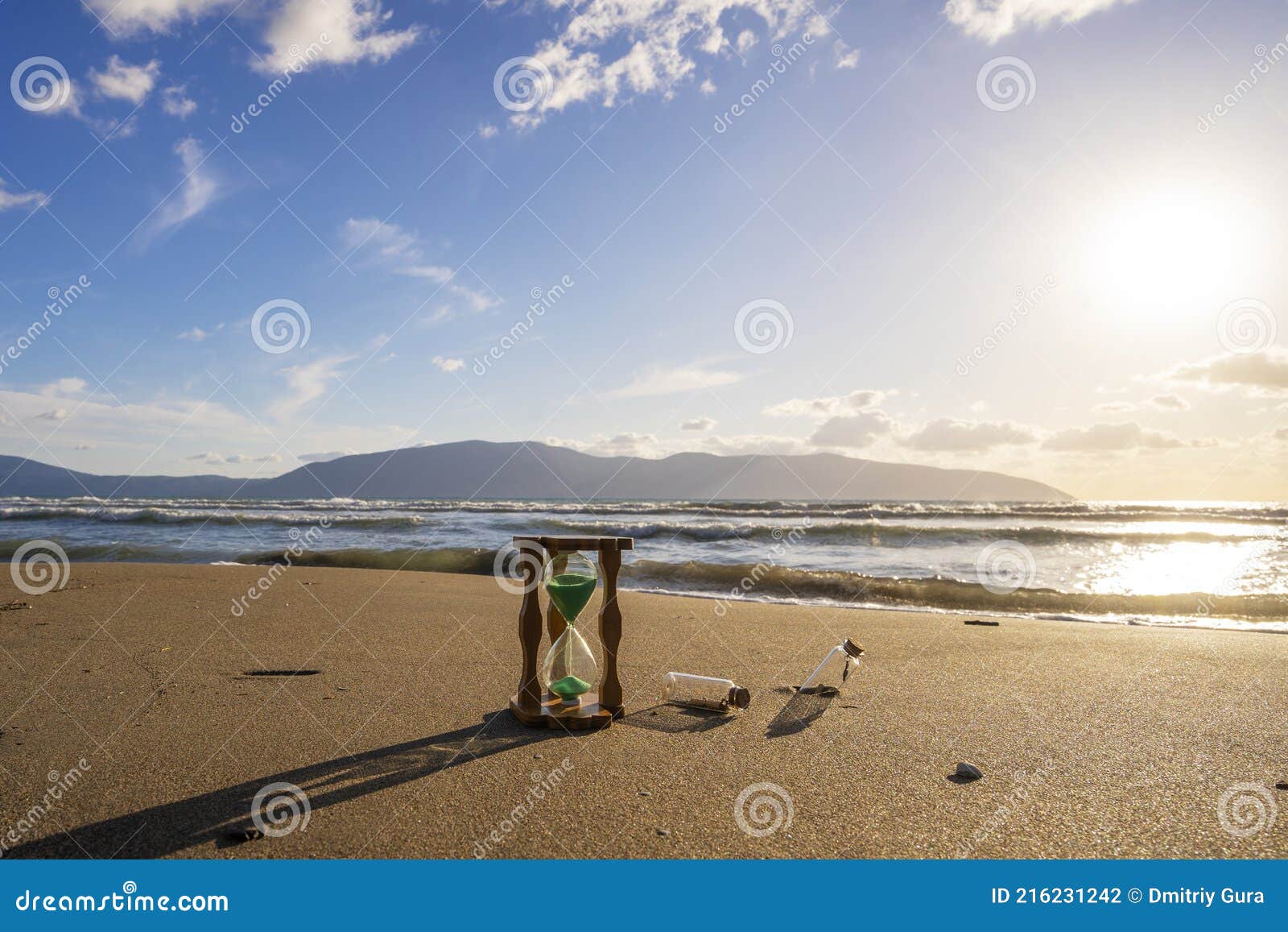 Closeup of Hourglass on the Sand.Timer Beach Sunset Stock Photo - Image ...