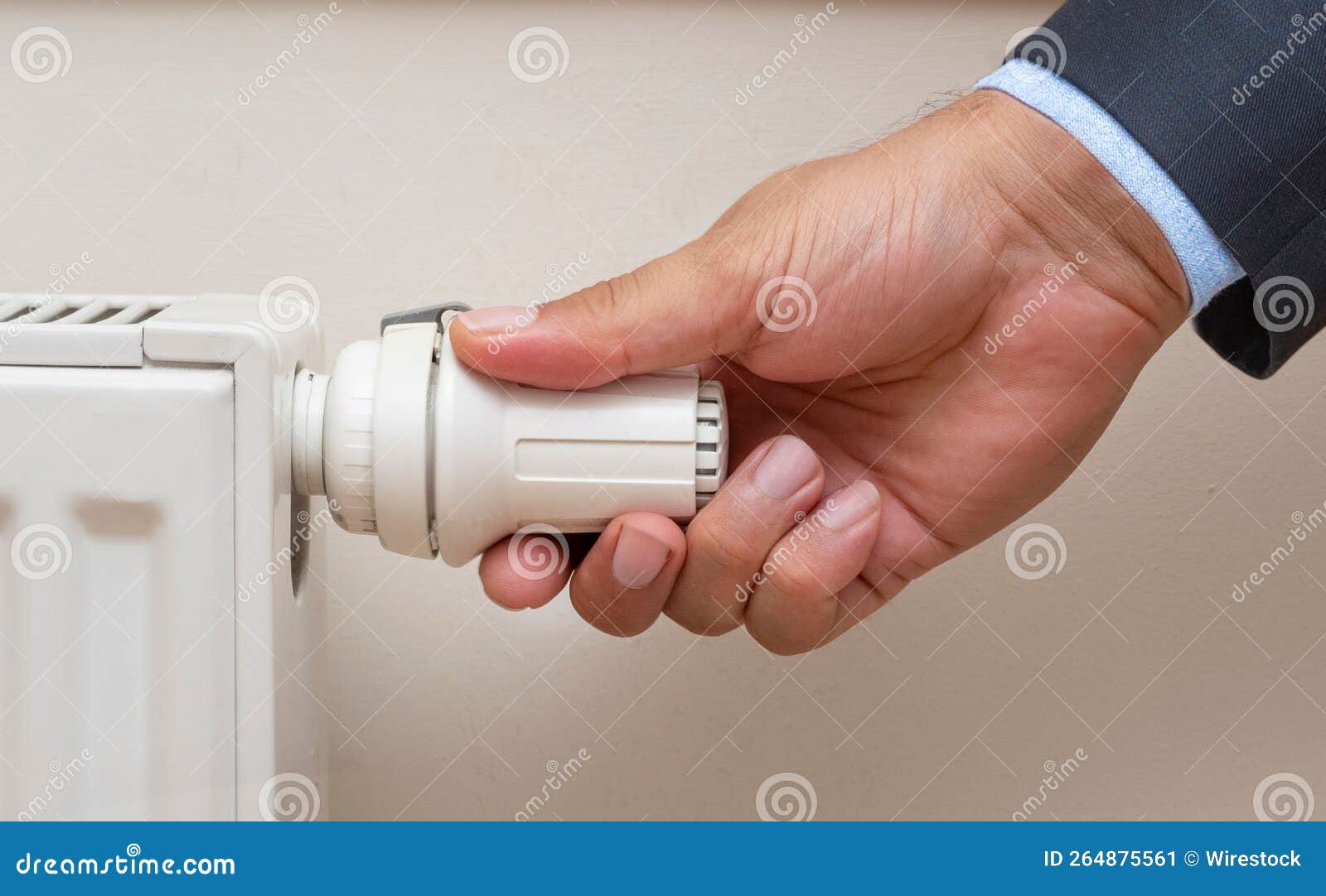 Closeup of Human Hand Adjusting the Temperature of a Radiator Stock ...