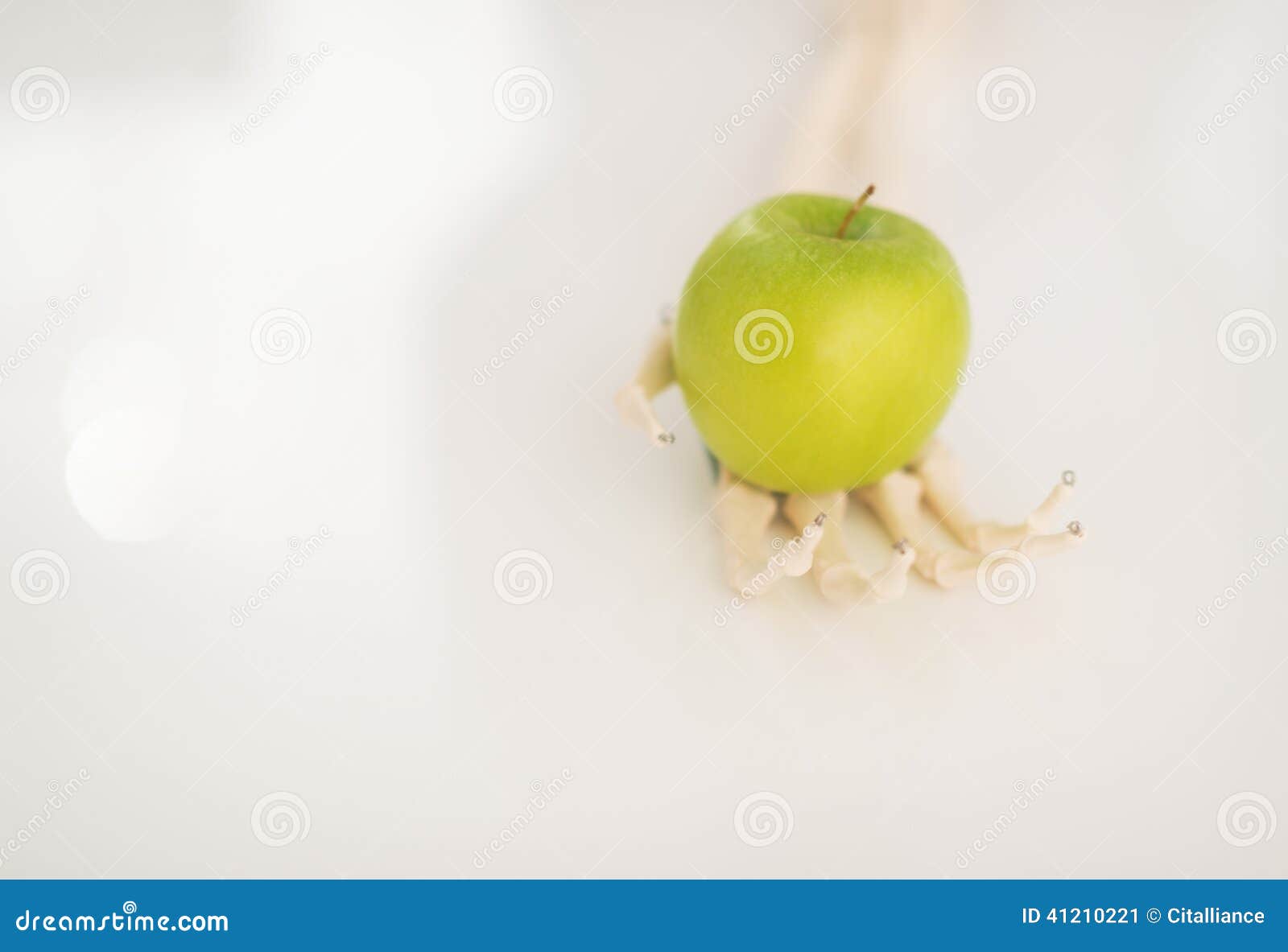 Skeleton Hand Holding Apple Stock Photos - Free & Royalty-Free Stock ...