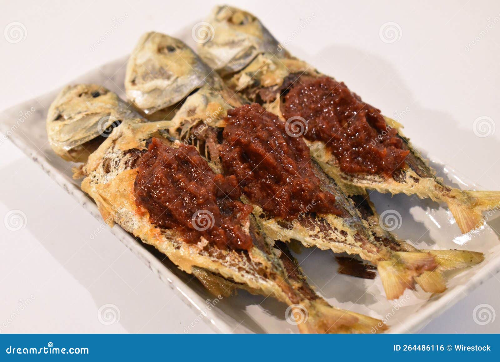 A Plate Of Ikan Keli Masak Lemak Cili Api Royalty-Free Stock ...