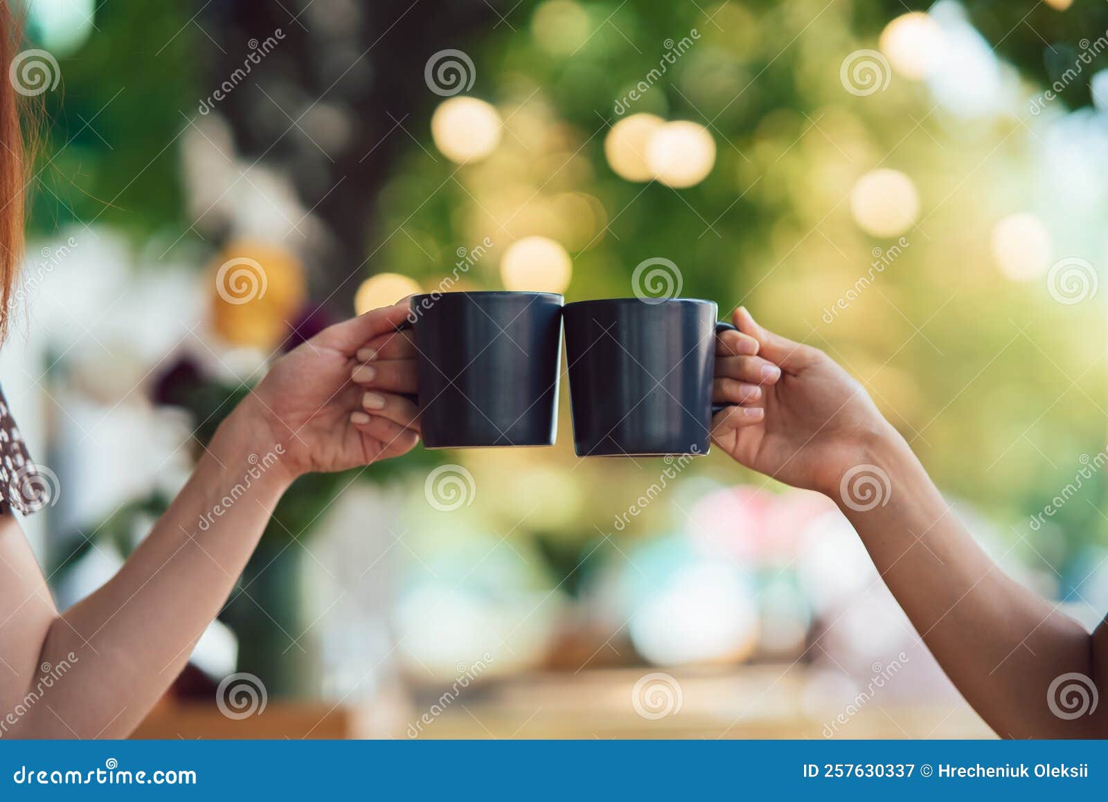 Closeup Image of a People Clinking Coffee Cups Together in Cafe Stock ...