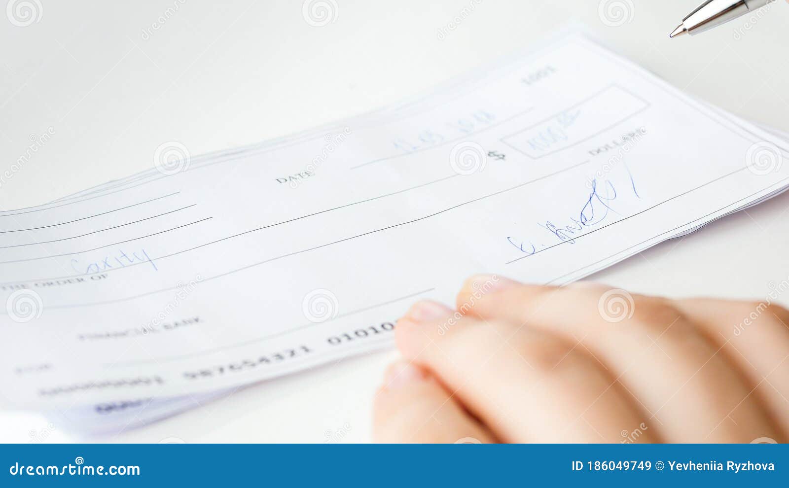 Closeup Image of Filled and Signed Banking Cheque Stock Image - Image ...