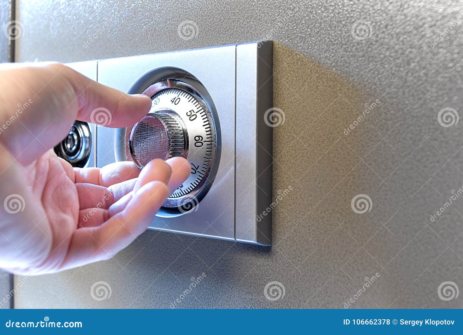 Closeup Image of a Hand Opens a Mechanical Lock of a Safe. Stock Photo ...