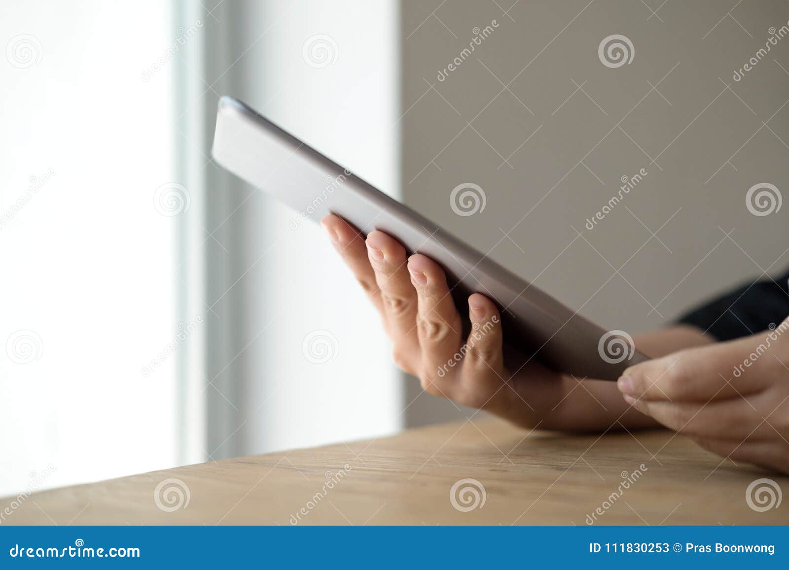 Hands Holding and Using Tablet Pc on Wooden Table Stock Image - Image ...