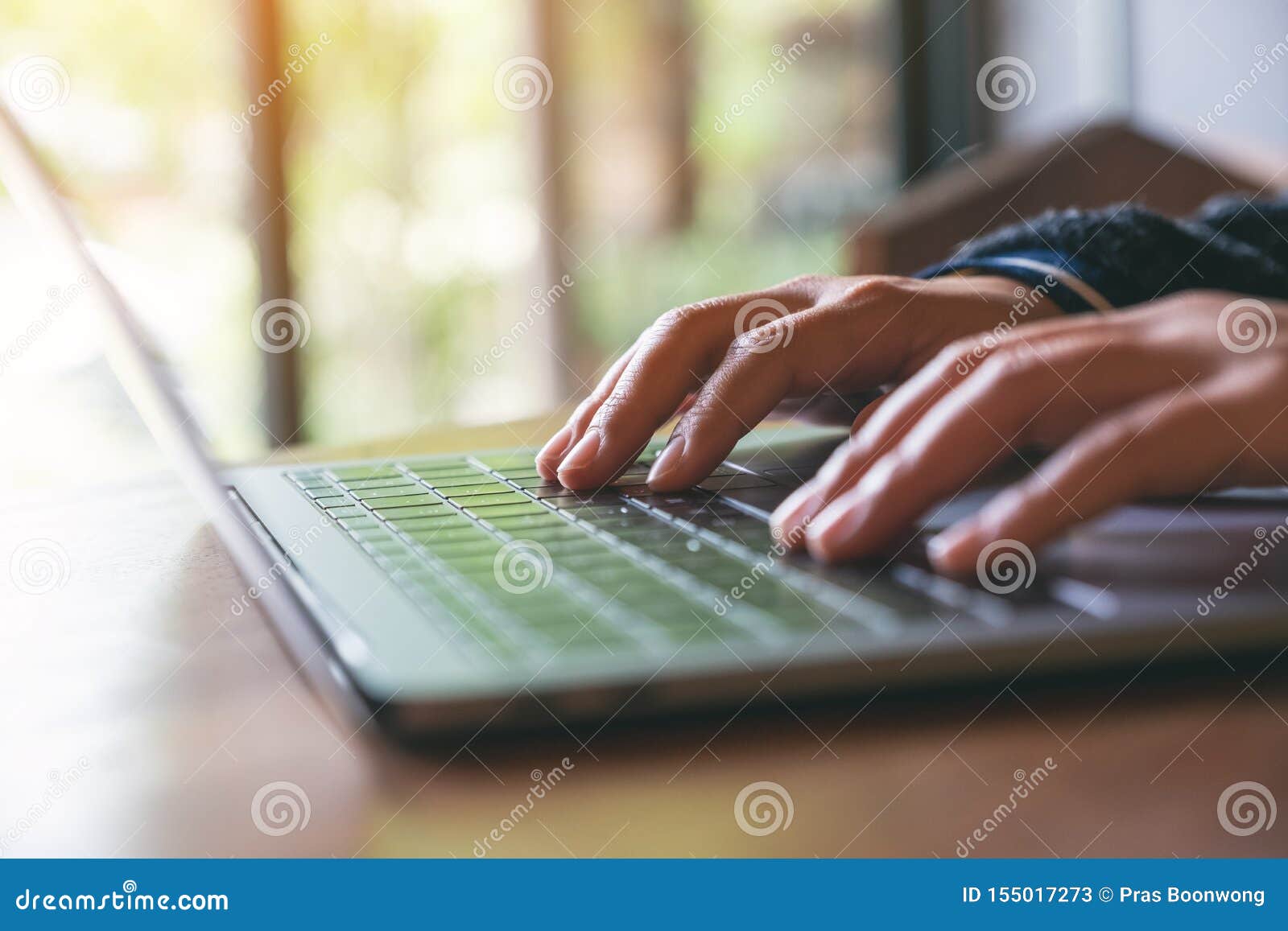 Hands Using and Typing on Laptop Computer Keyboard on the Table Stock ...