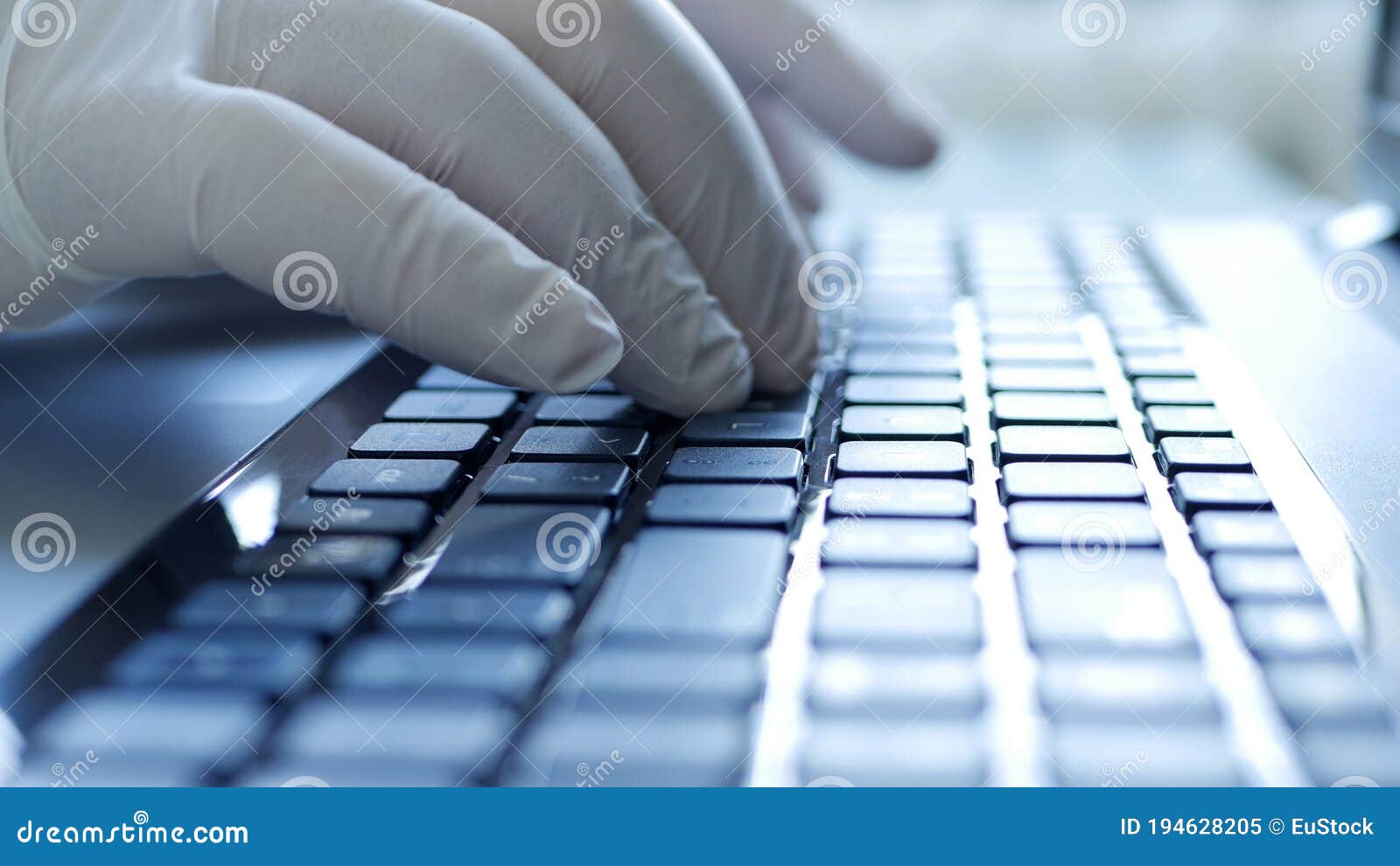 Closeup Image with Hands Wearing Protective Gloves Using the Laptop ...