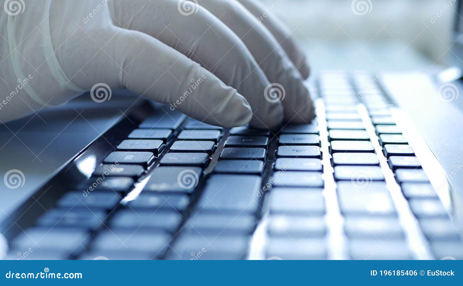 Closeup Image with Hands Wearing Protective Gloves Using the Laptop ...