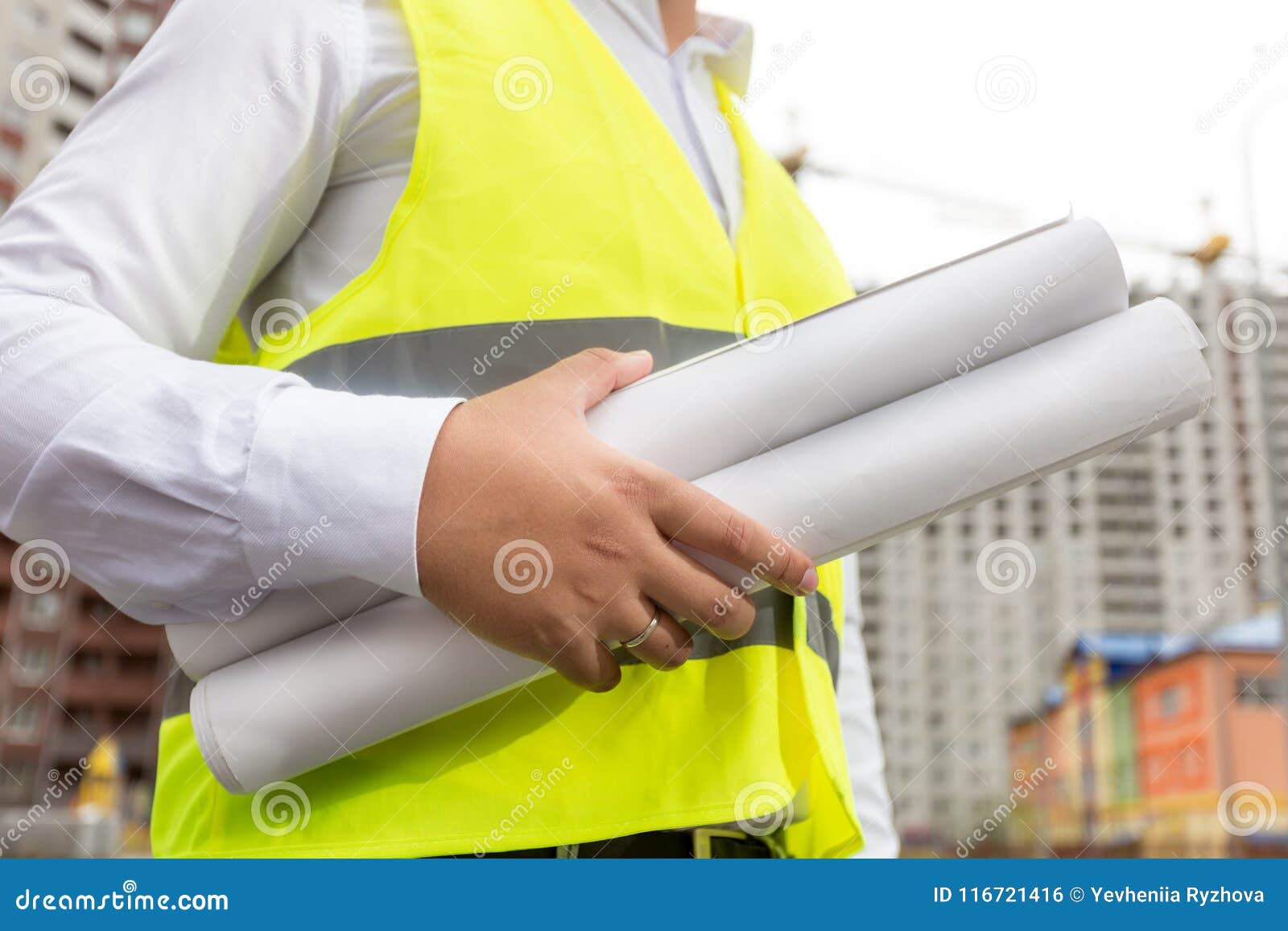 Closeup Image of Male Architect Holding Blueprints of New Houses Stock ... Closeup Image of Male Architect Holding Blueprints of New Houses Stock ...