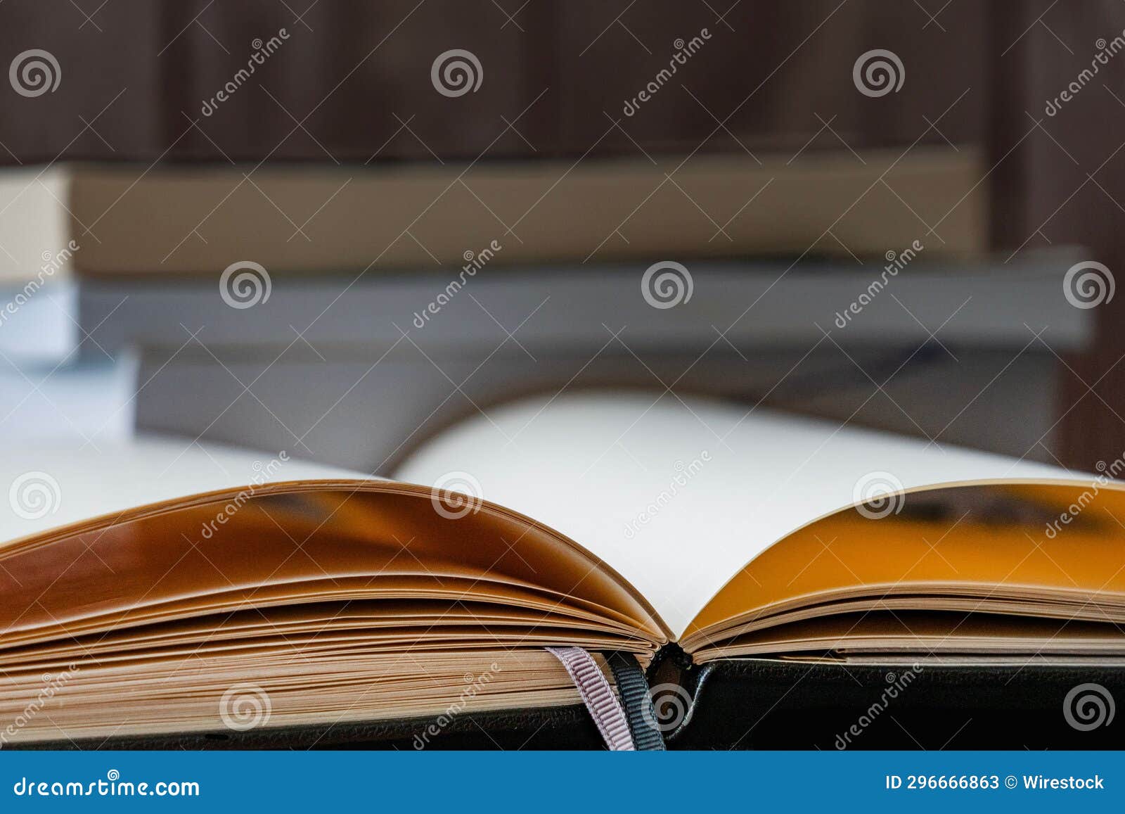 Closeup Image of an Open Book on a Desk, with the Cover Page and Pages ...