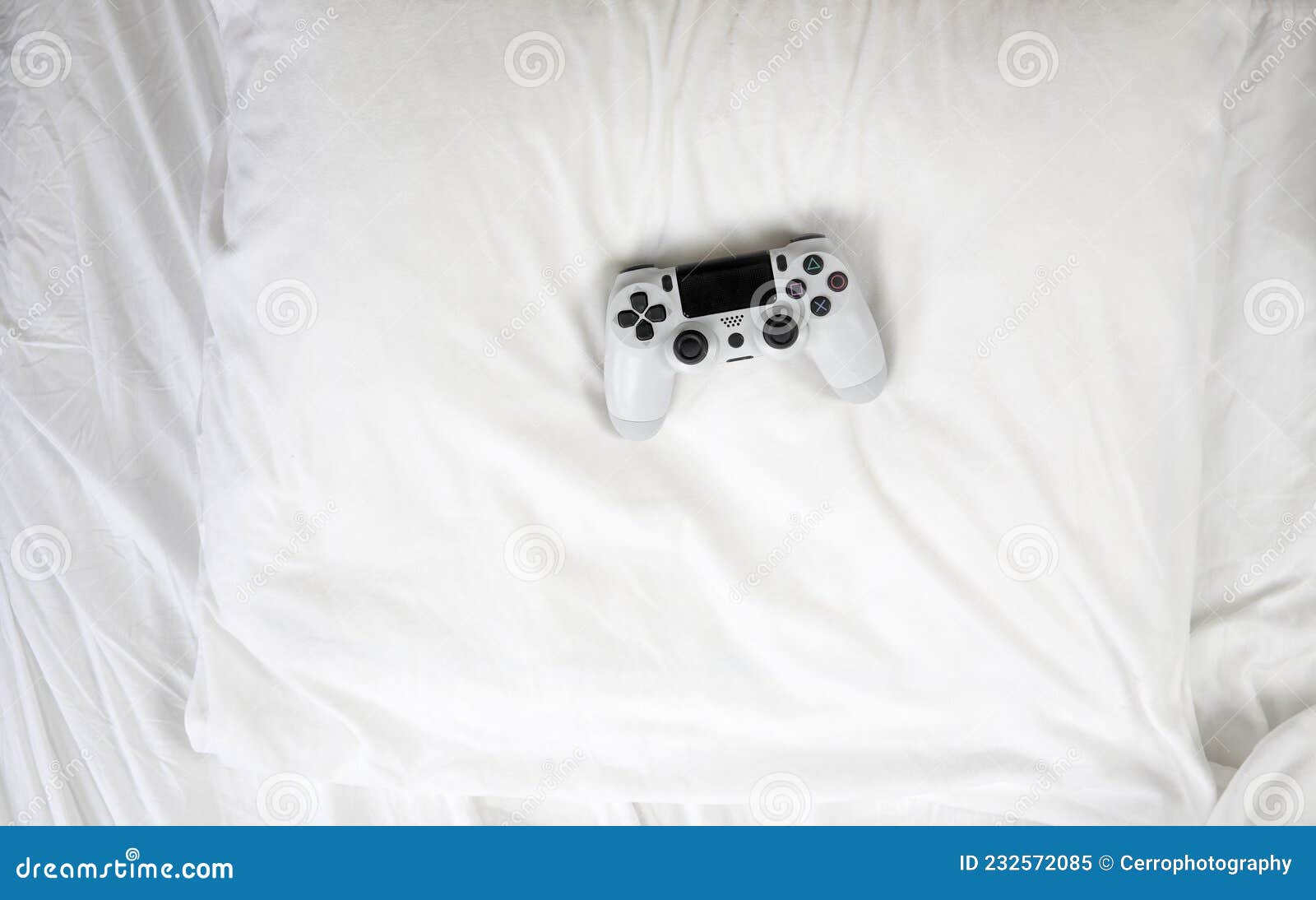 Closeup Image Top View Game Controller, Lying on White Sheets of Bed at ...