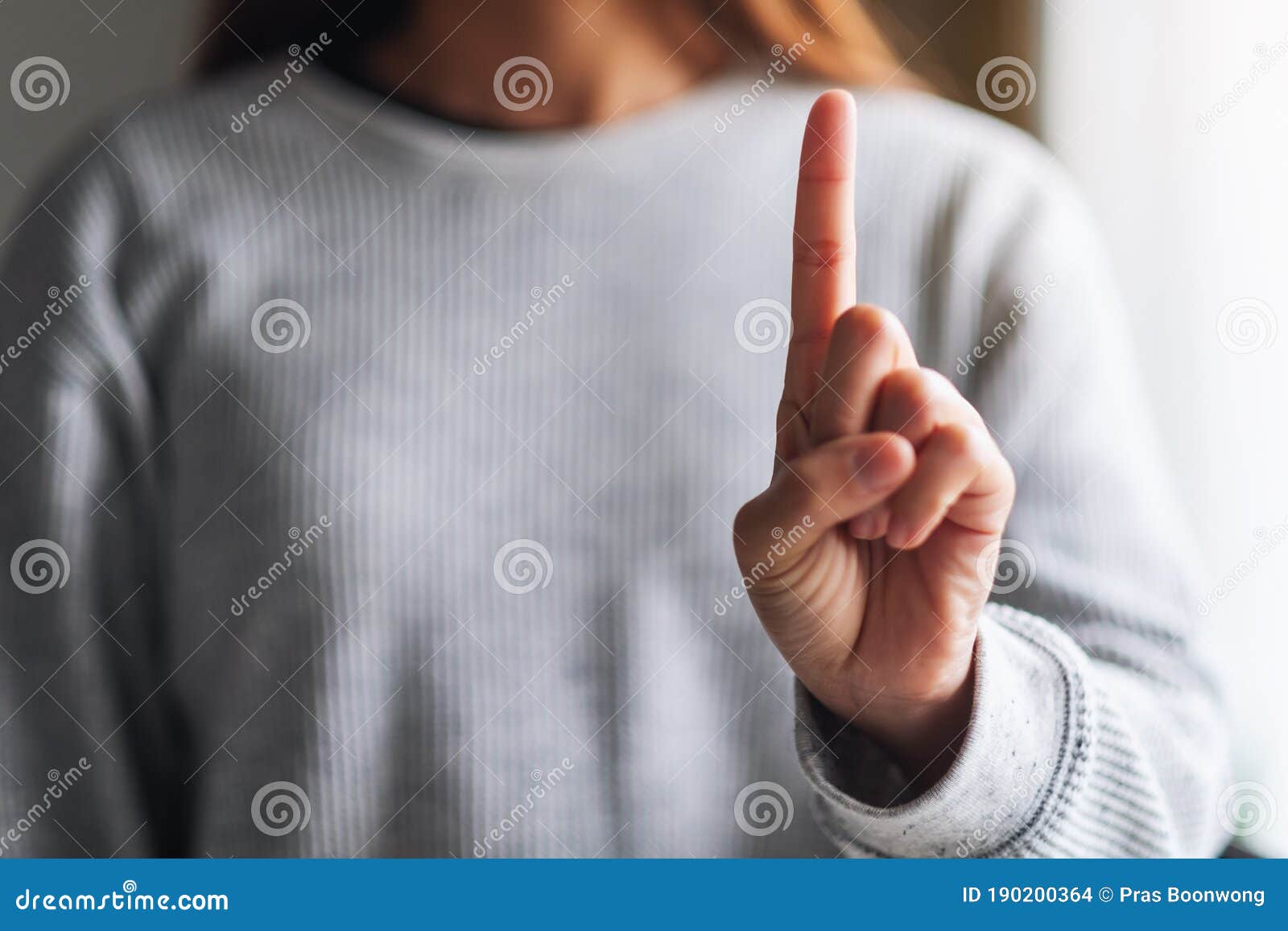 A Woman Making and Showing Number One Hand Sign Stock Photo - Image of ...