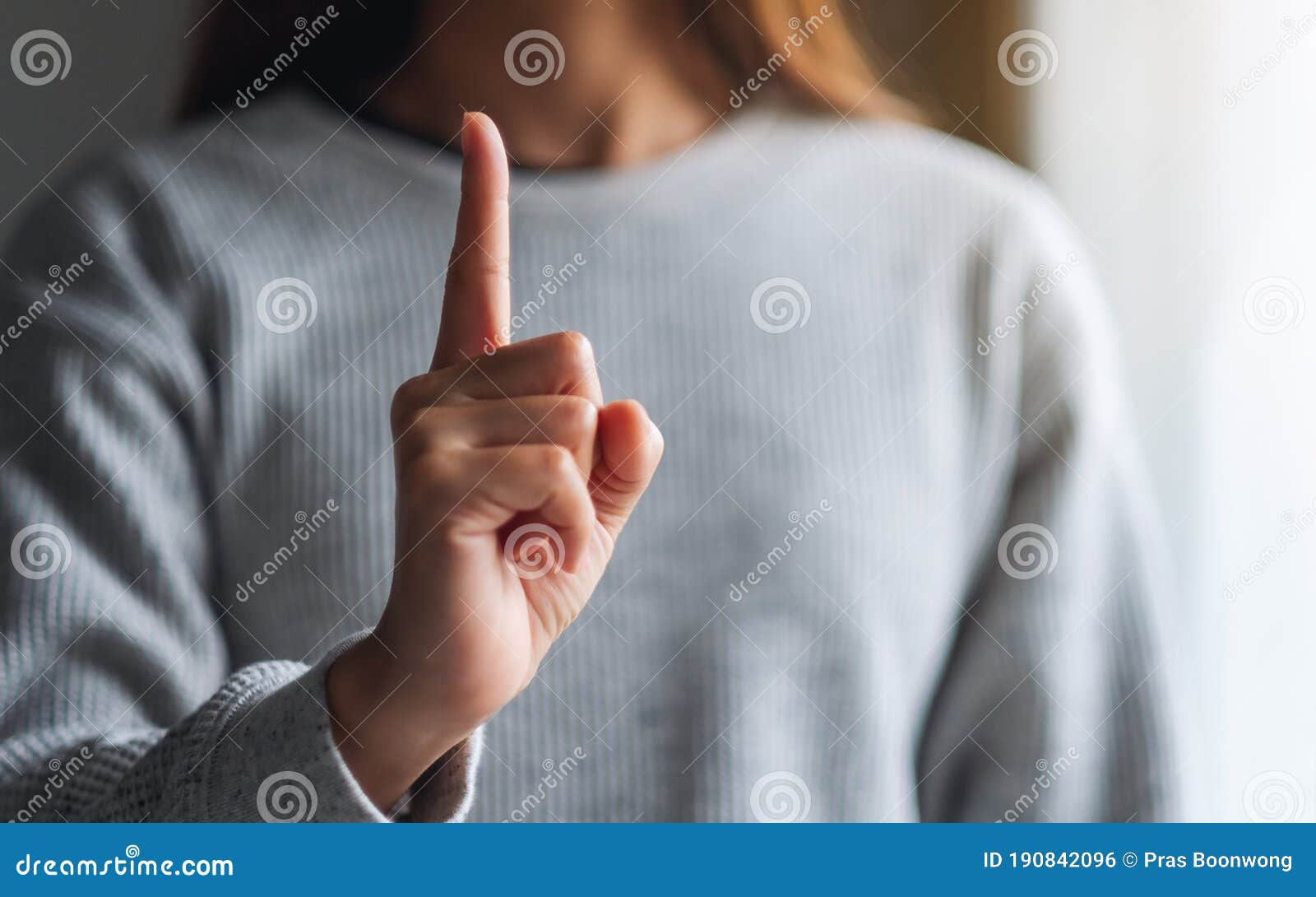 A Woman Making and Showing Number One Hand Sign Stock Photo - Image of ...