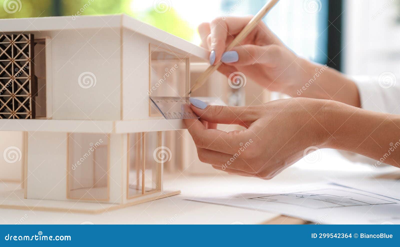 Young Beautiful Architect Hand Measure House Model by Using Ruler ...