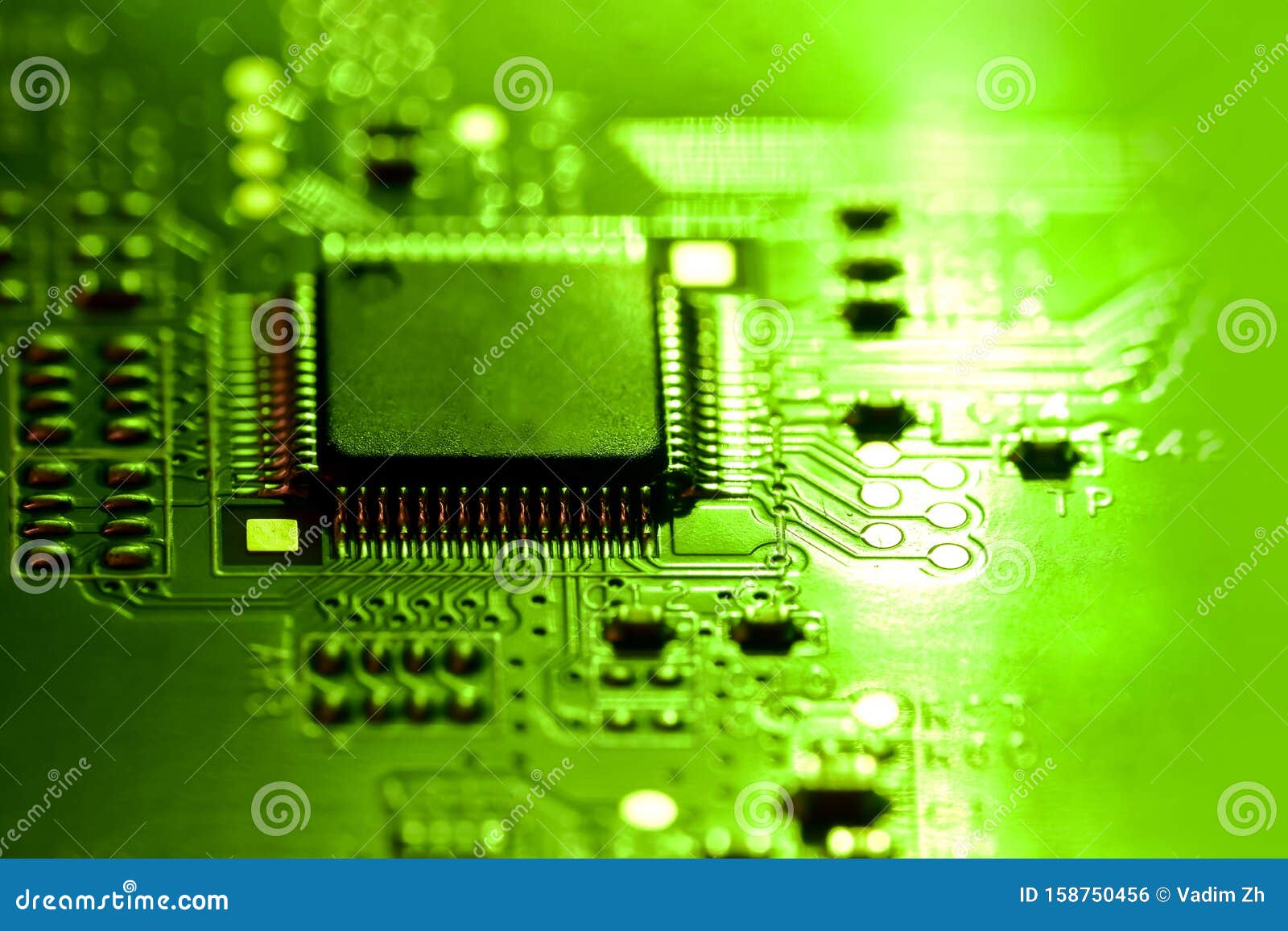 Closeup of Integrated Electronic Circuit in a Bright Green Light Stock ...