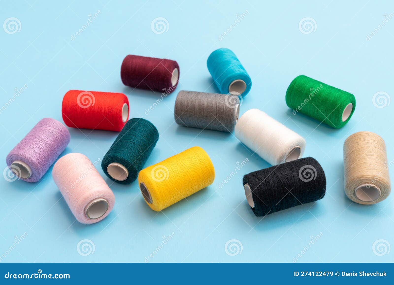 Closeup Isometric View of Scattered Colored Spools of Sewing Threads ...