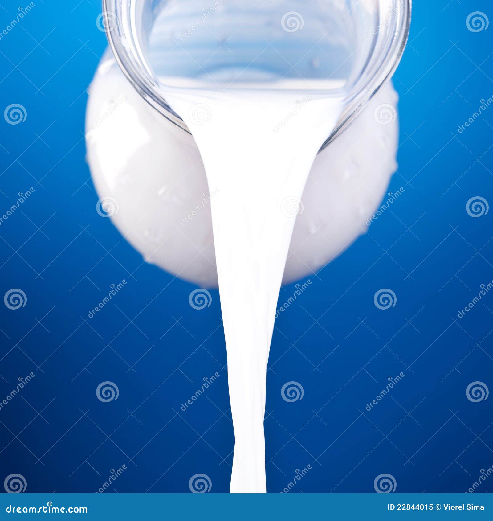 Closeup of a Jug with Pouring Milk Stock Image - Image of natural, blue ...