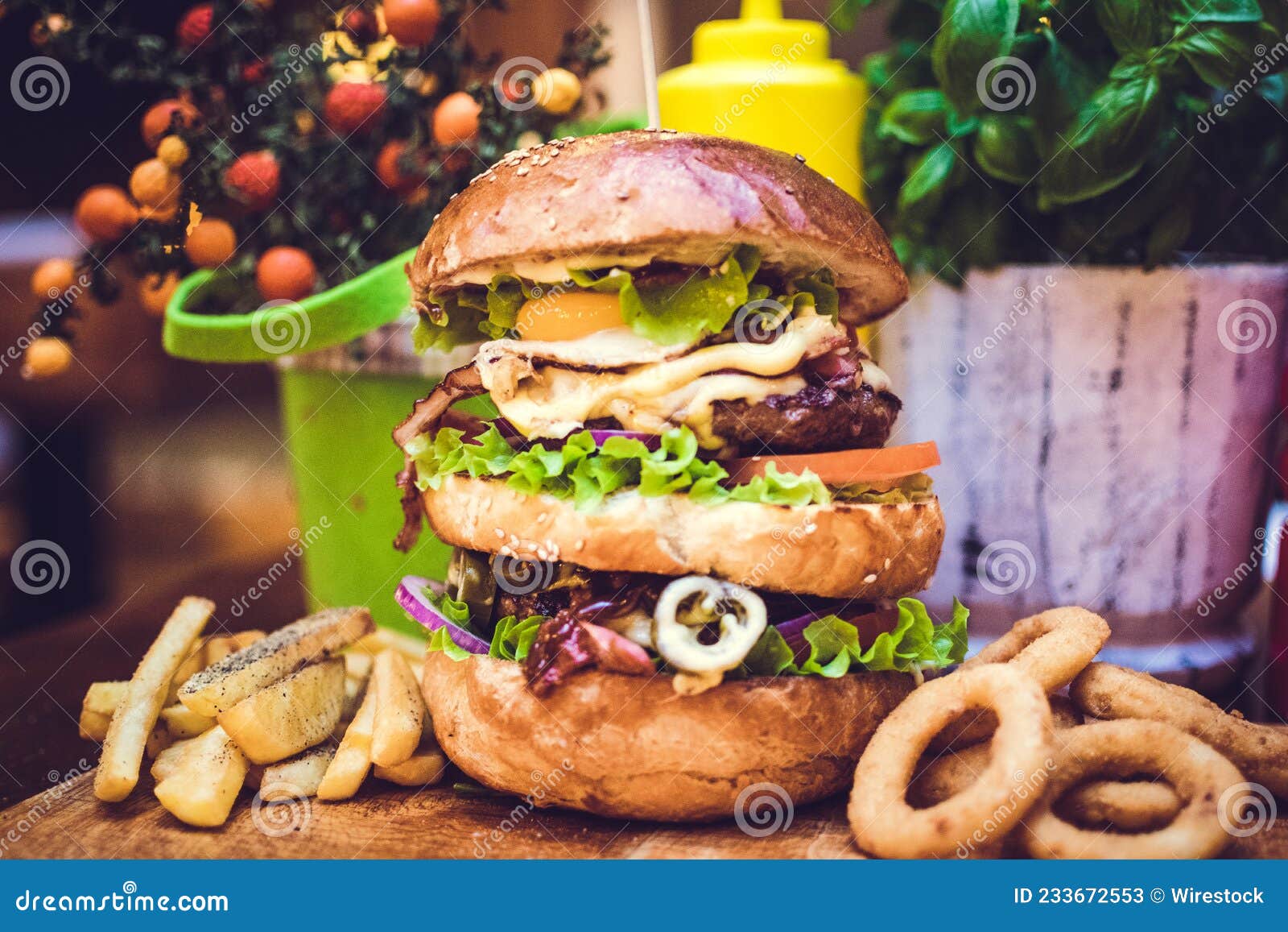 Closeup of a Jumbo Burger Served in a Restaurant Stock Image - Image of ...