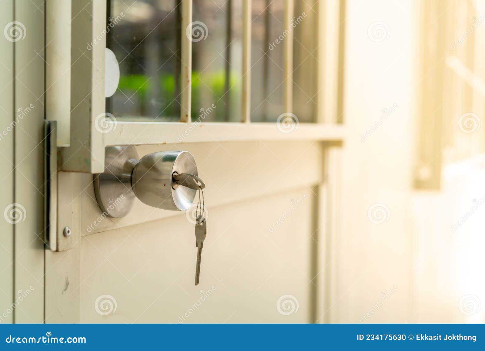 Closeup, the Key is Inserted on the Silver Doorknob. Which is Installed ...