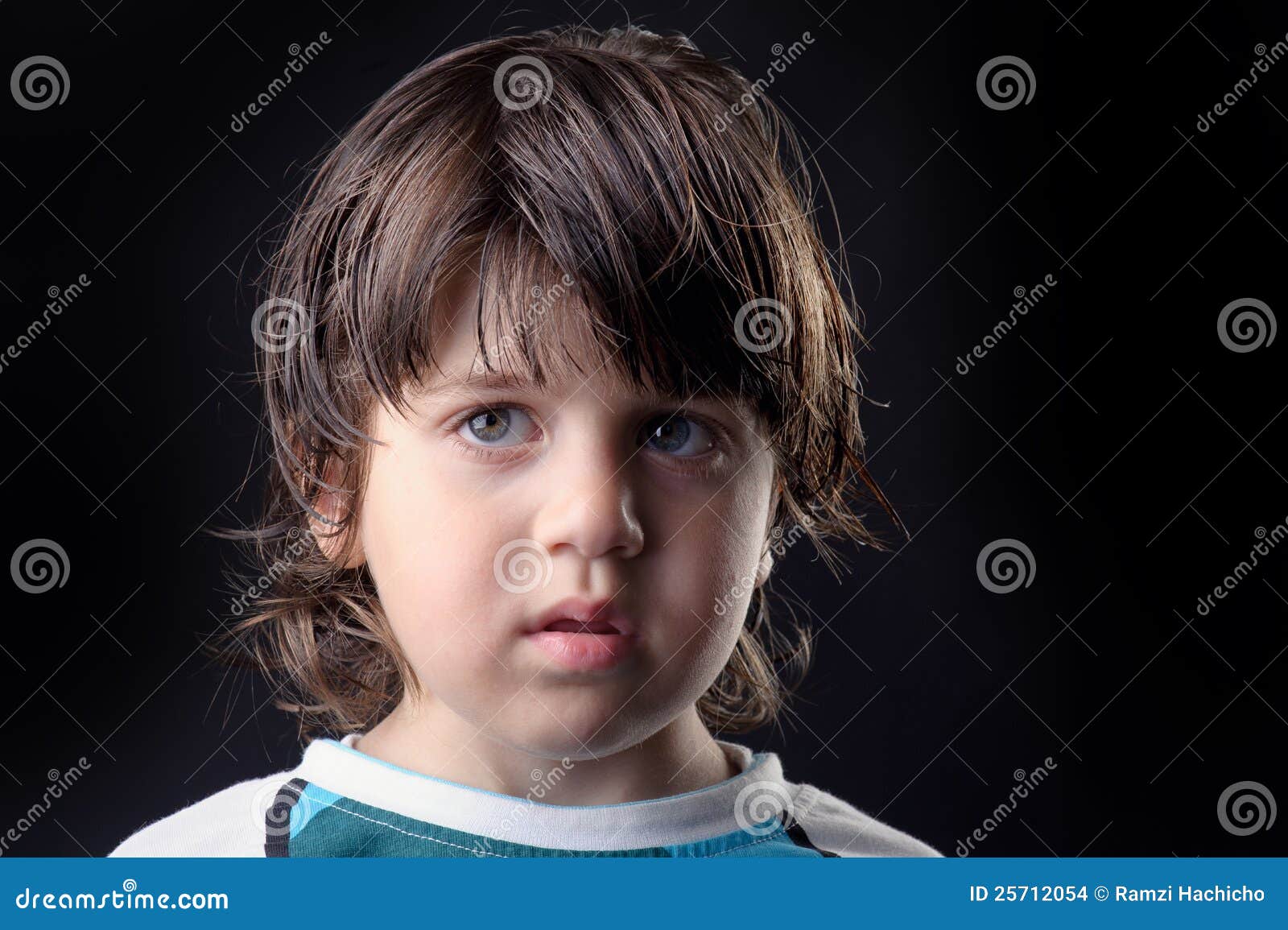 Closeup of a Kid with a Shy Expression Stock Photo - Image of face ...