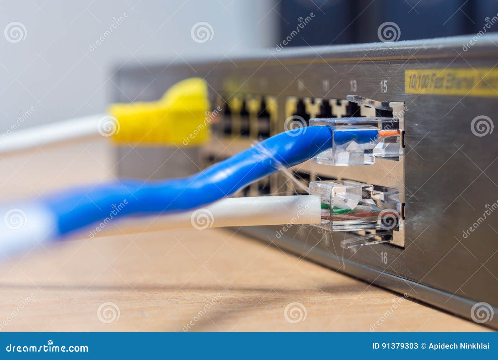 Closeup of LAN Cable with RJ45 Connector Plugged into Fast Ethernet ...