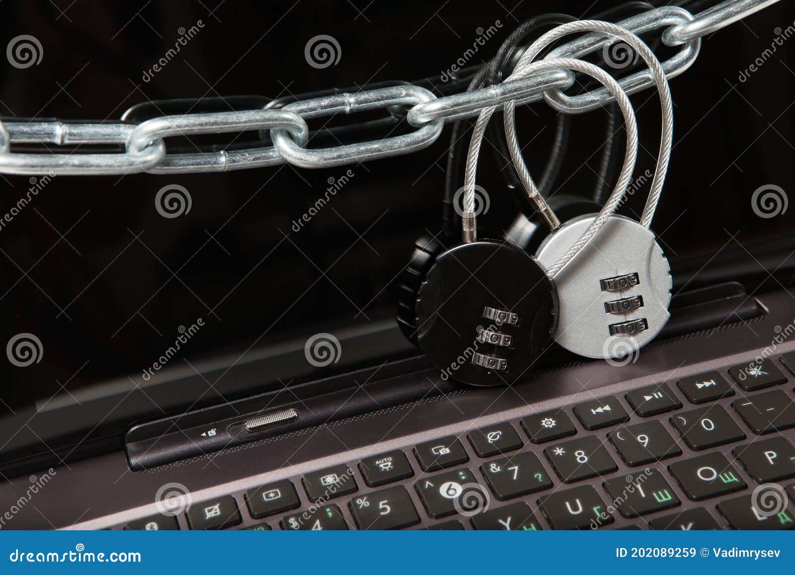 Closeup of Laptop with Chains and Locks. Information Security Concept ...