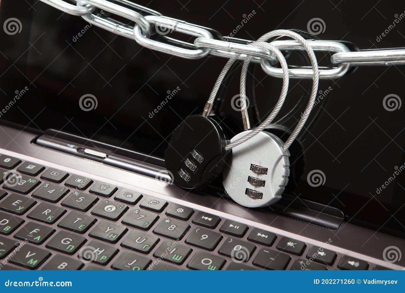 Closeup of Laptop with Chains and Locks. Information Security Concept ...